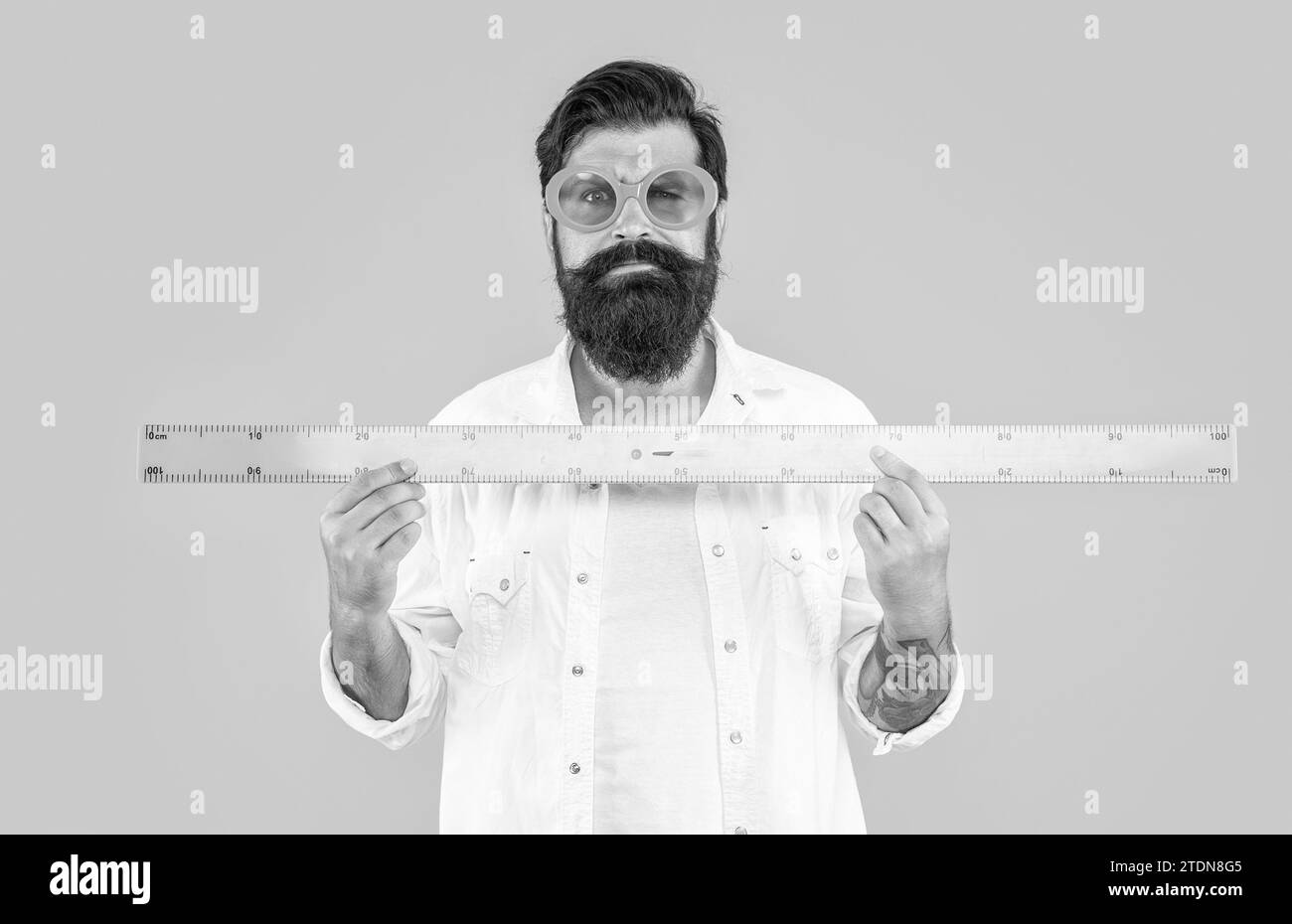 confused school man measure with ruler isolated on yellow. school man ...