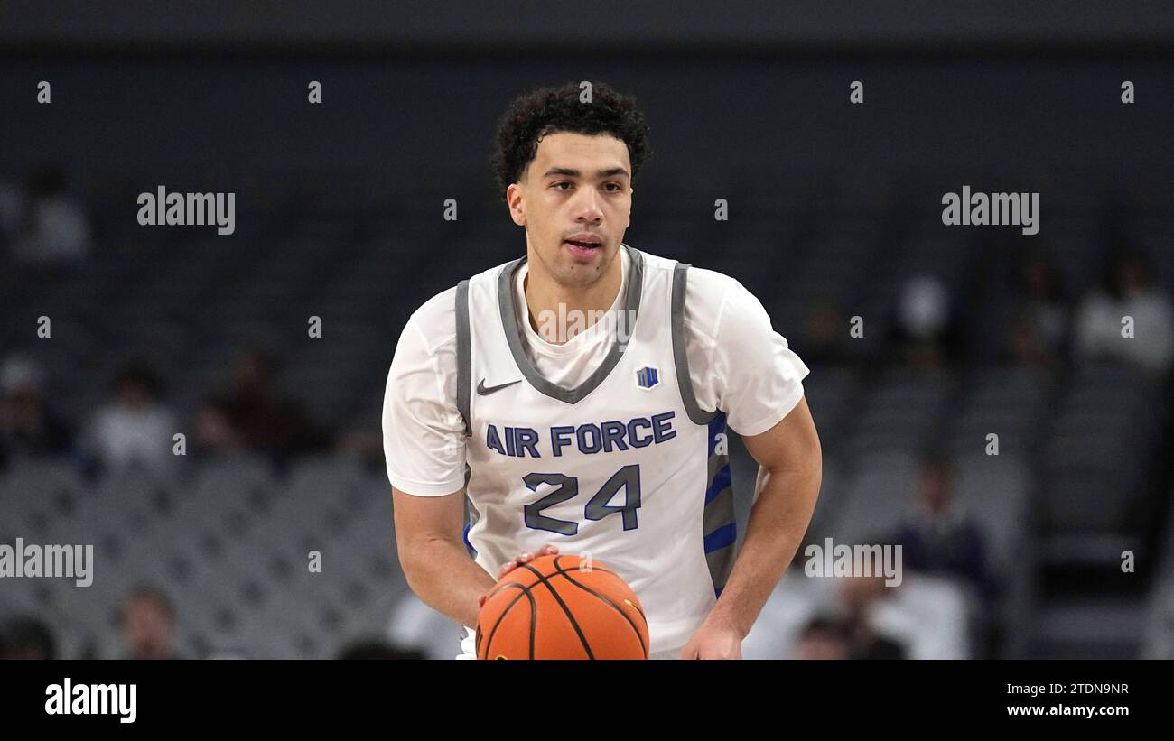 Air Force guard Jeffrey Mills handles the ball during an NCAA college ...