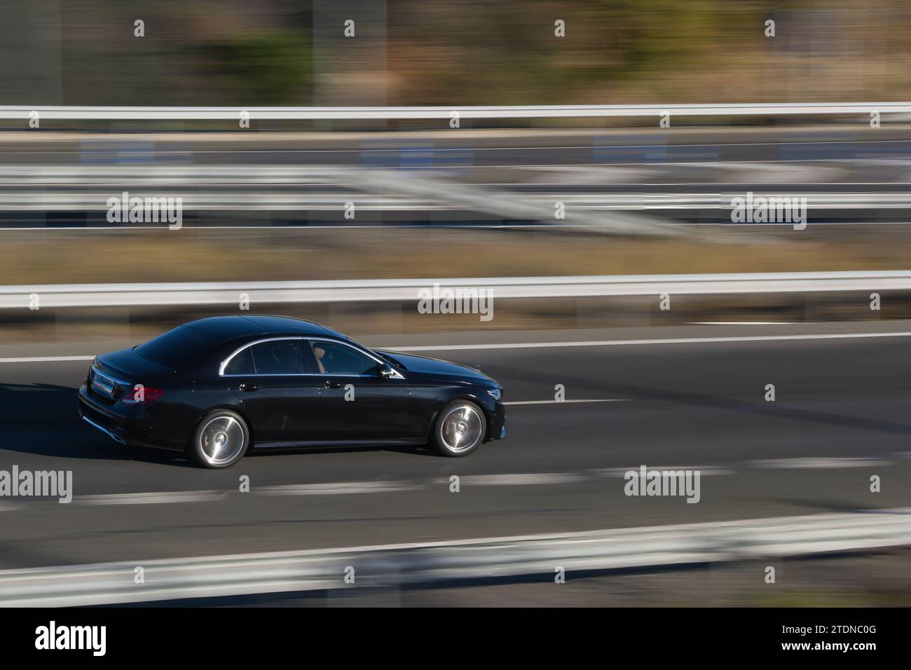 passenger car on highway transportation auto motion blur wheels ...