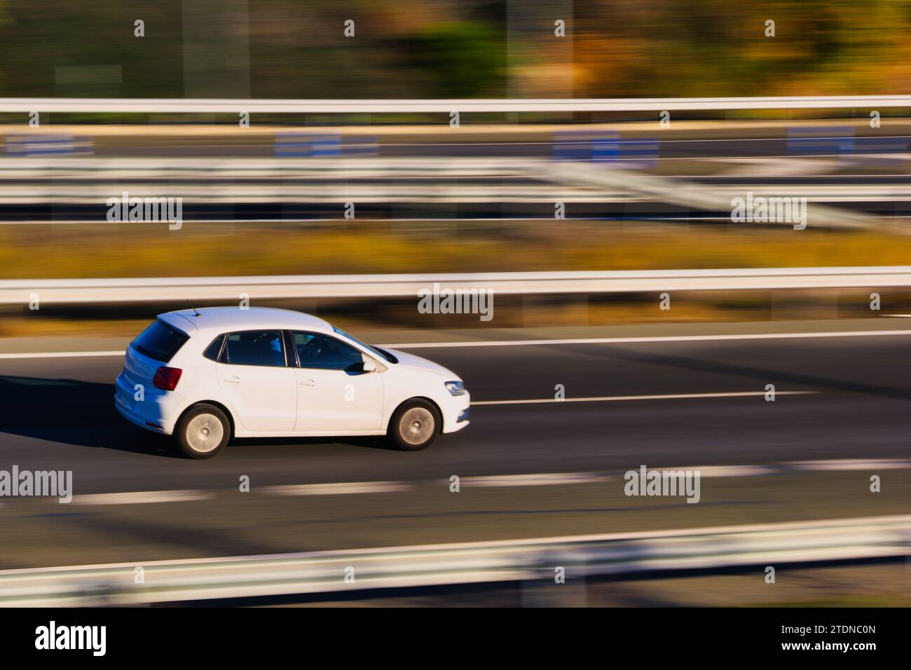 passenger car on highway transportation auto motion blur wheels ...