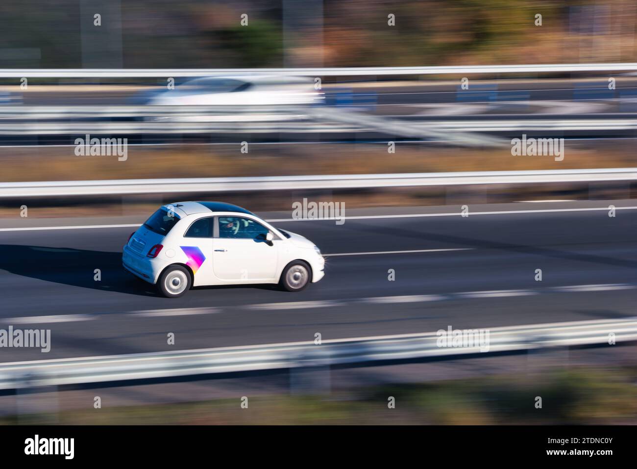 passenger car on highway transportation auto motion blur wheels ...