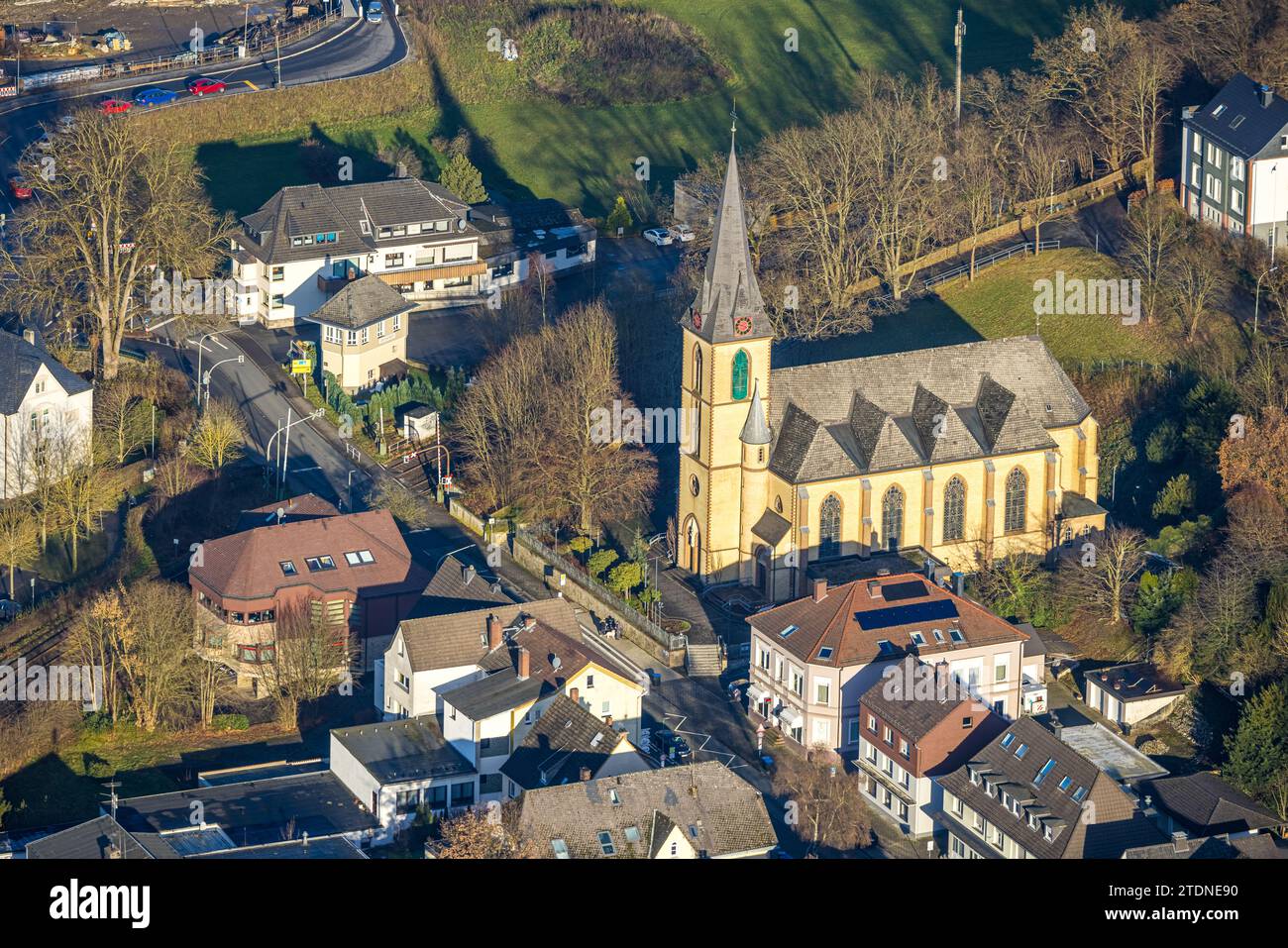 Aerial view, catholic parish church Holy Family, surrounded by autumnal ...