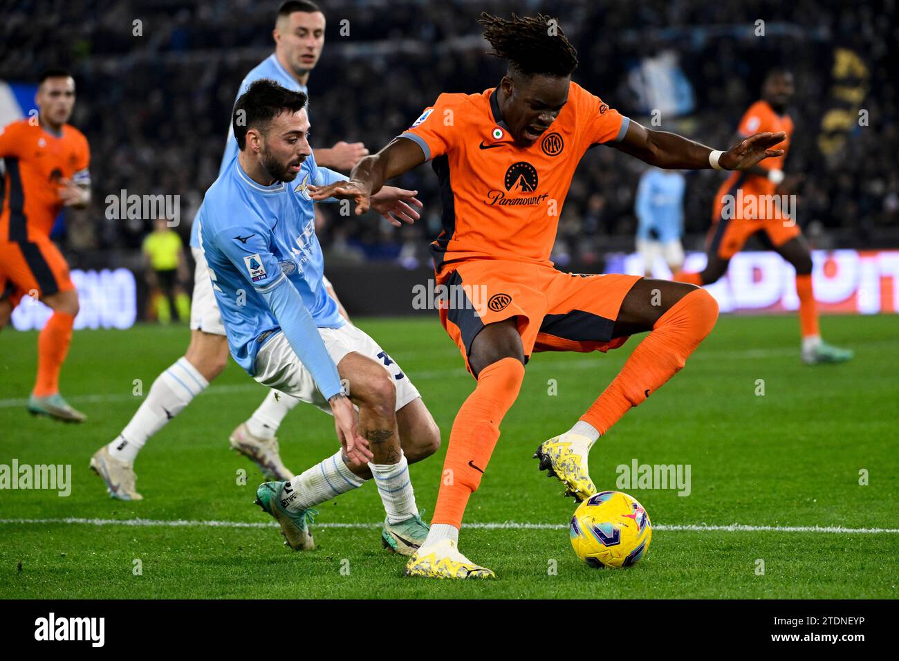Mario Gila of SS Lazio and Yann Aurel Bisseck of FC Internazionale compete for the ball during ...