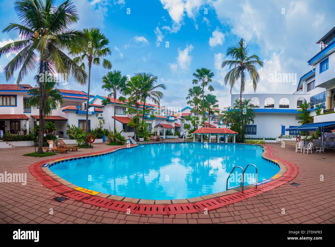 Goa, India - May 22, 2022: Luxury resort with swimming pool and palm ...