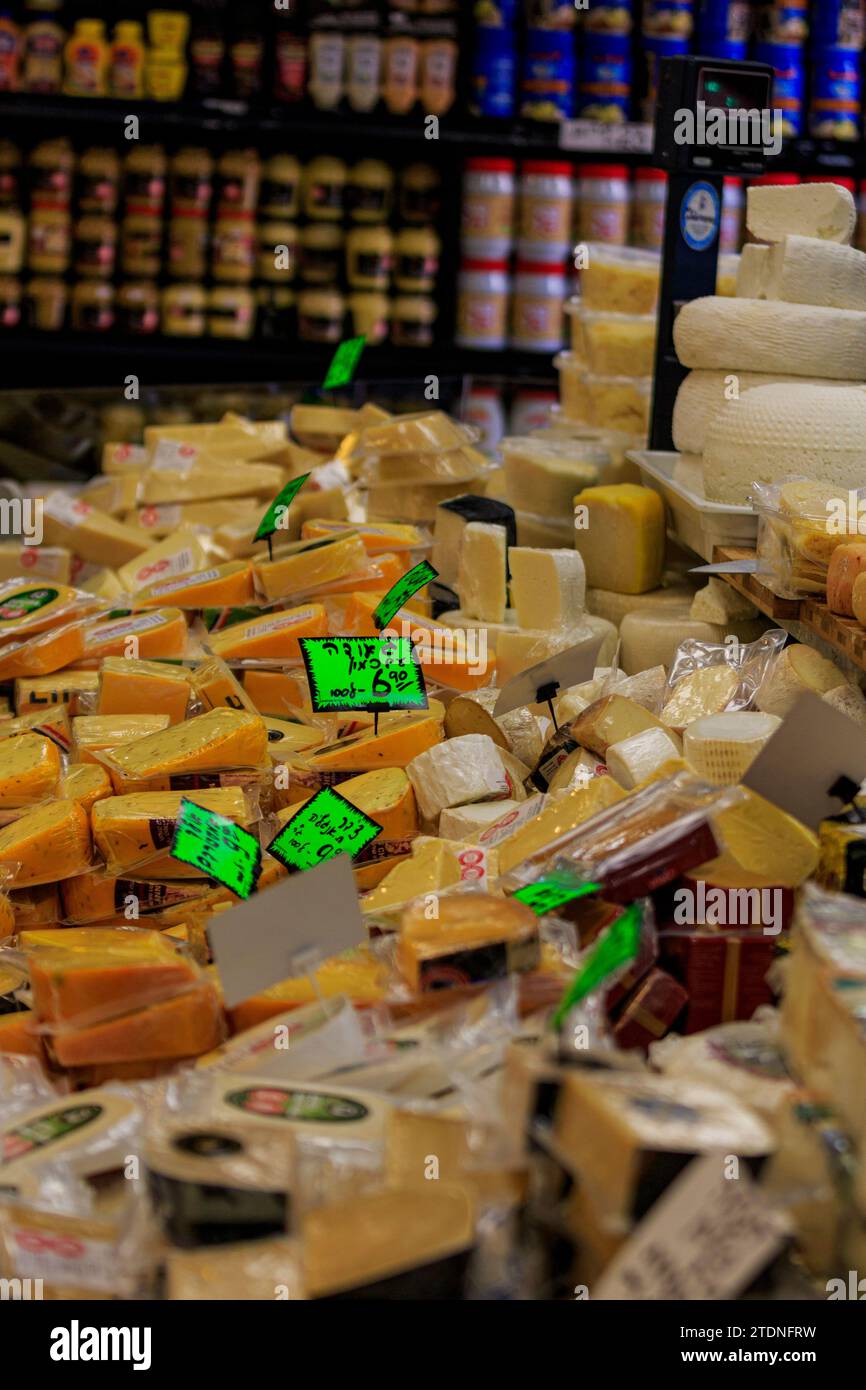 A vertical shot of a Cheese shop in the Carmel Market Stock Photo - Alamy