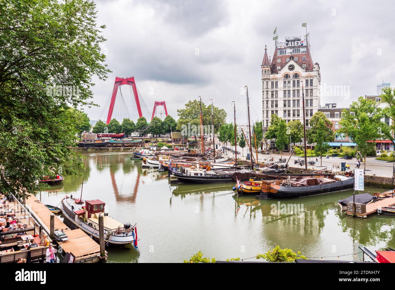 The Old Port of Rotterdam with river boats, overlooked by the Witte ...