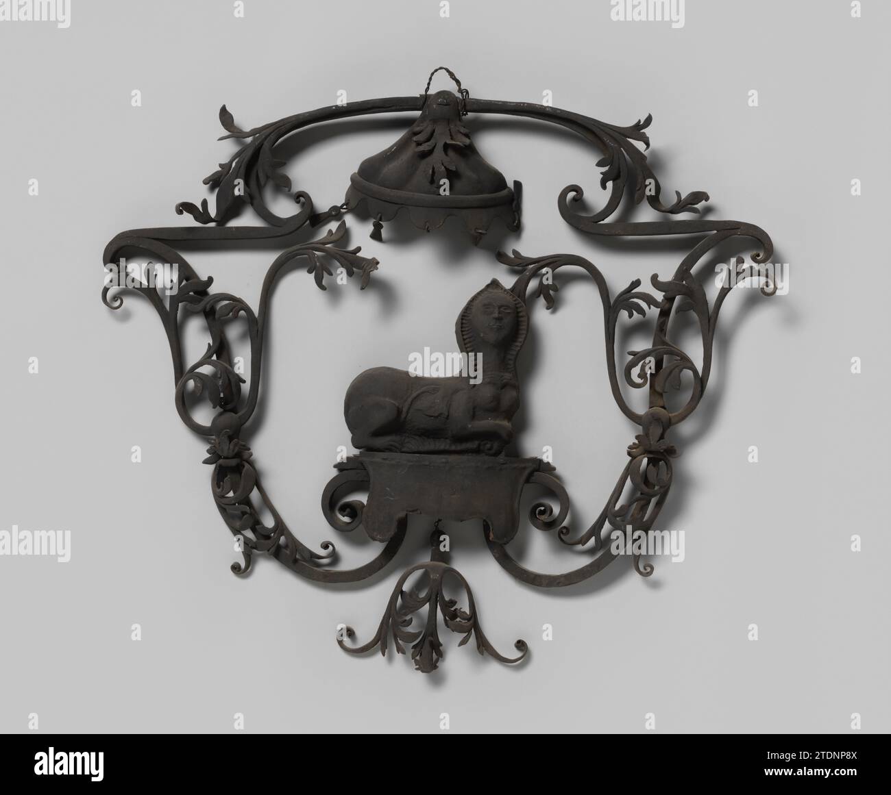 Signboard with sphinx under canopy., C. 1400 - c. 1950 A forged iron ...