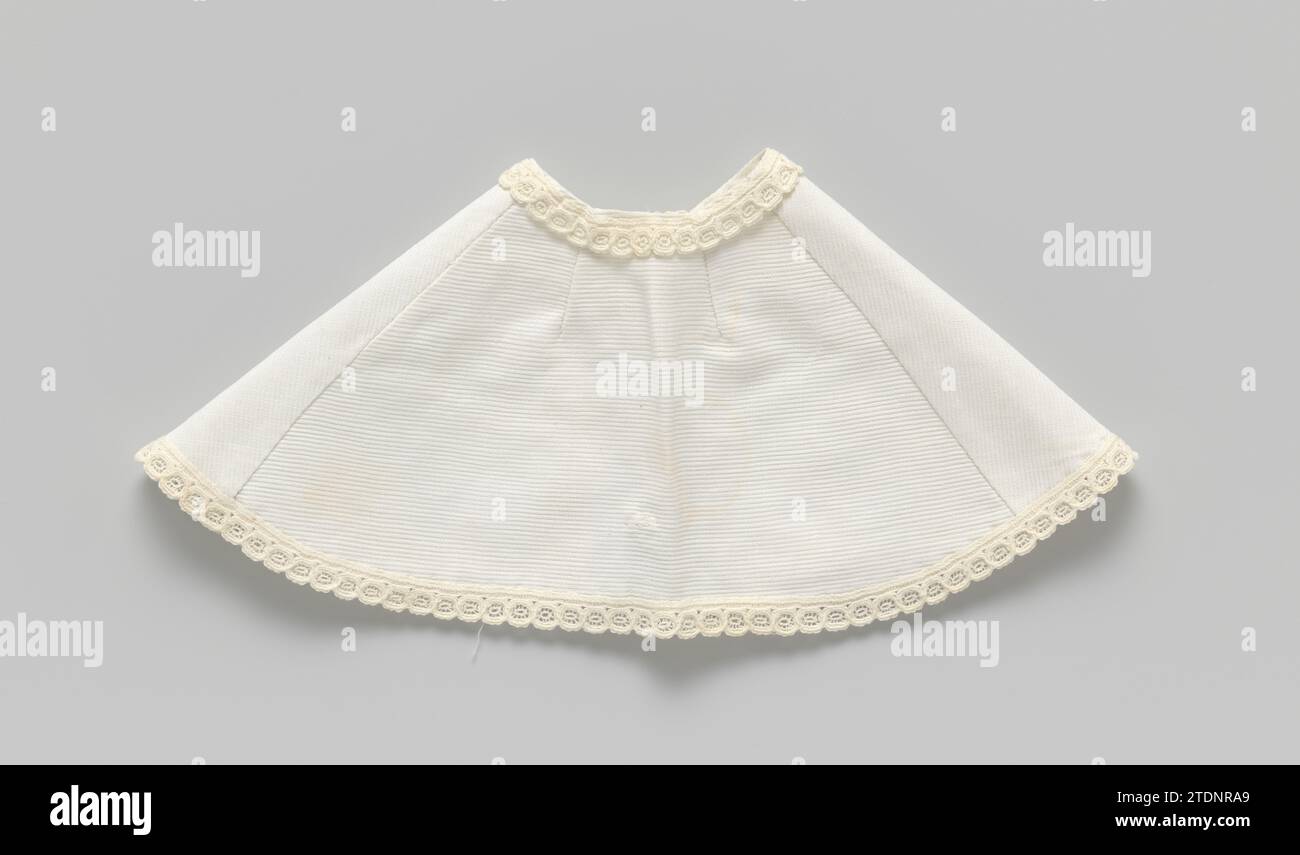 Shoulder mantle of white cotton trimmed with a scalloped edge ...
