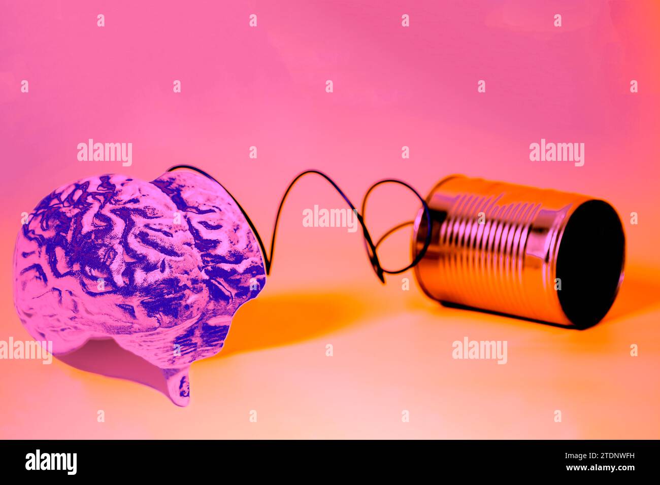 tin can phone with human brain anatomical model. communication concept ...