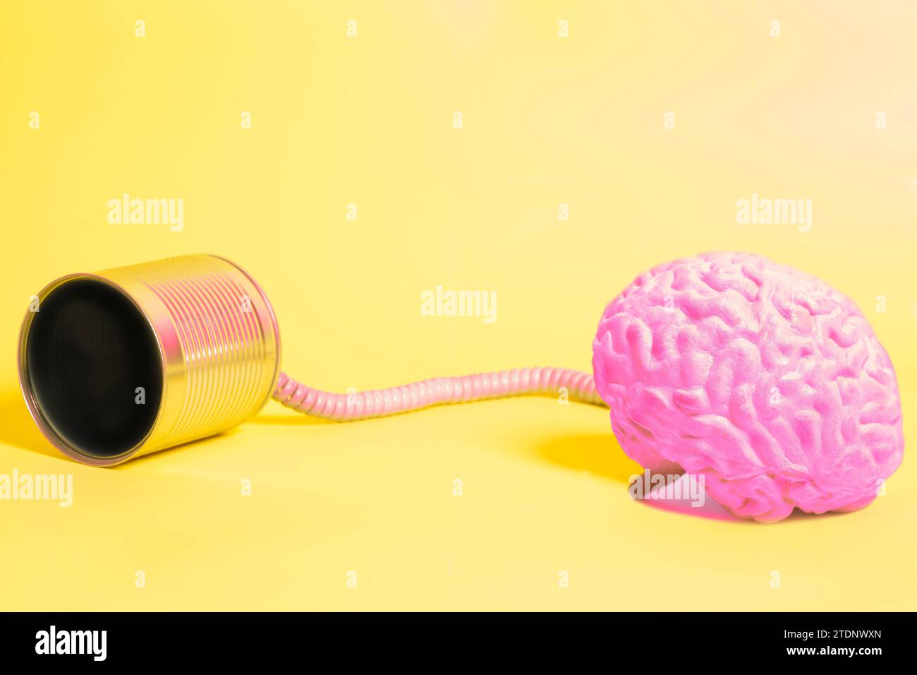 tin can phone with human brain anatomical model. communication concept ...