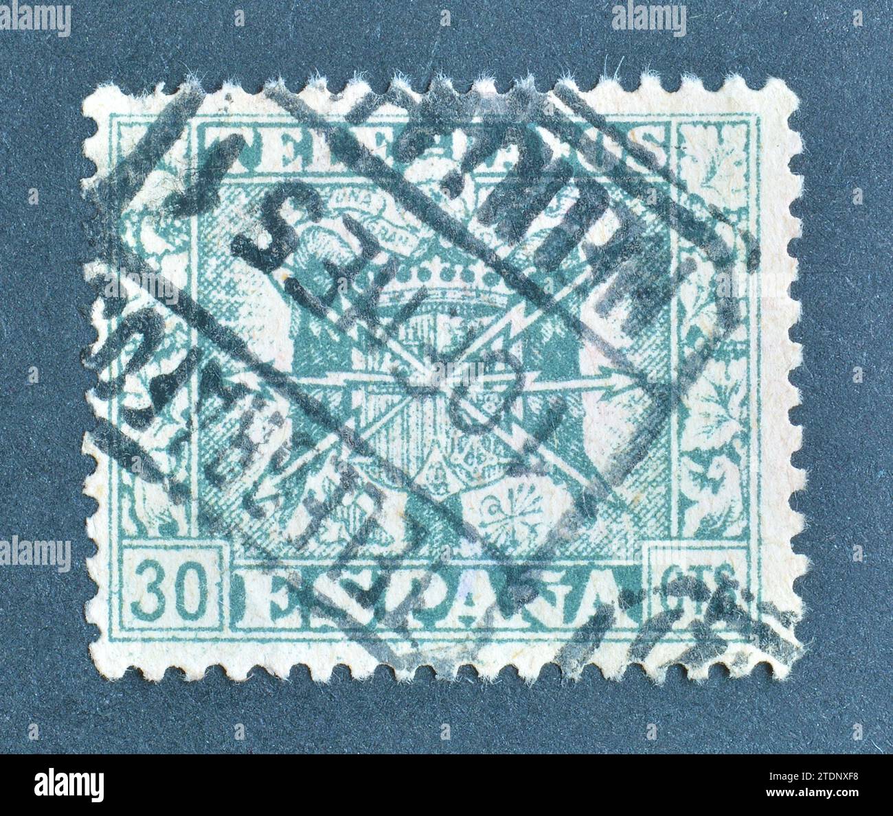 Cancelled postage stamp printed by Spain that shows Coat of arms, circa ...