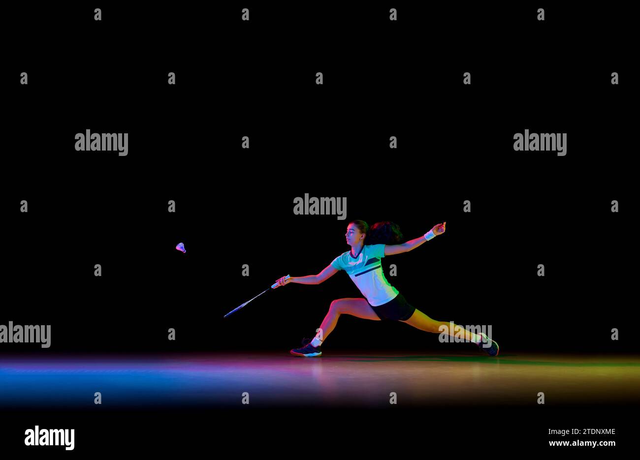 Badminton athlete demonstrates her skills in attack and defense against ...