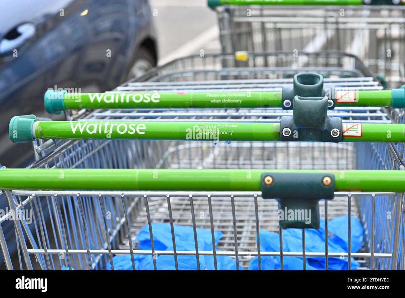 Waitrose supermarket and trolley sign and logo in London, England, UK ...