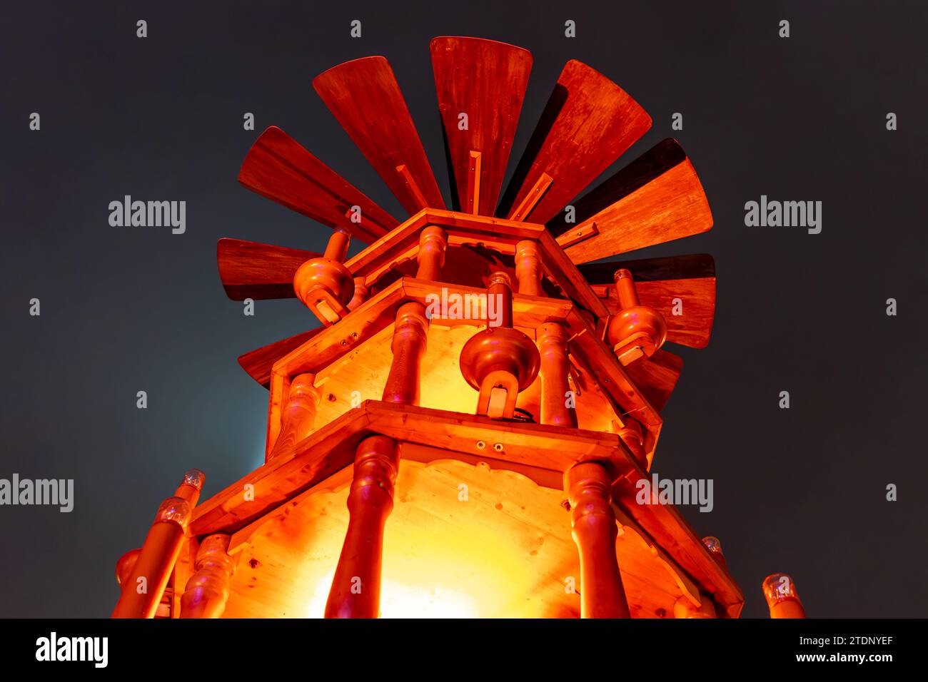 A traditional wooden windmill or tower, on a sausage stall at a German ...