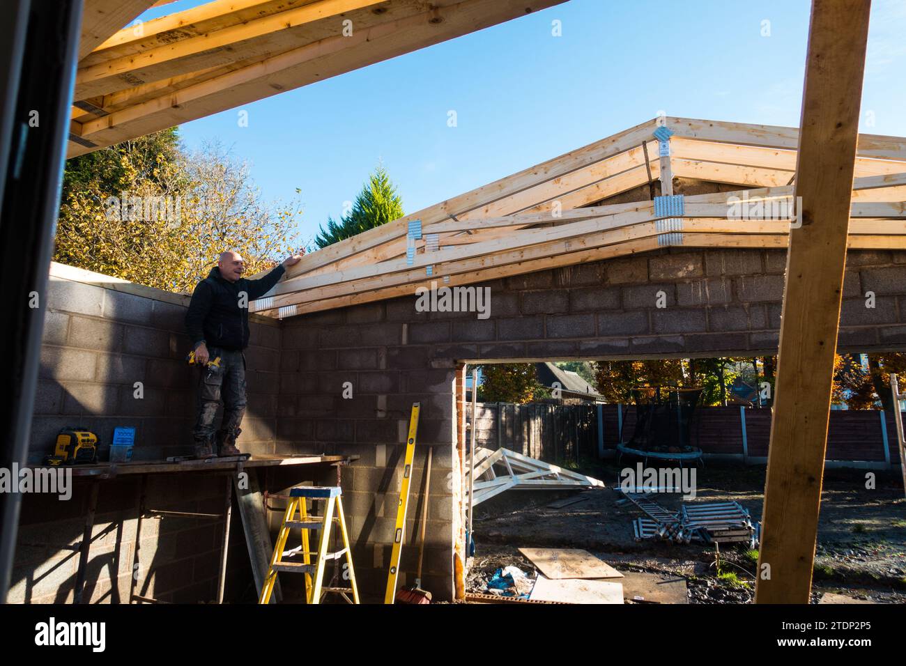 Roofing Rafters being put into a home extension. England UK Stock Photo ...
