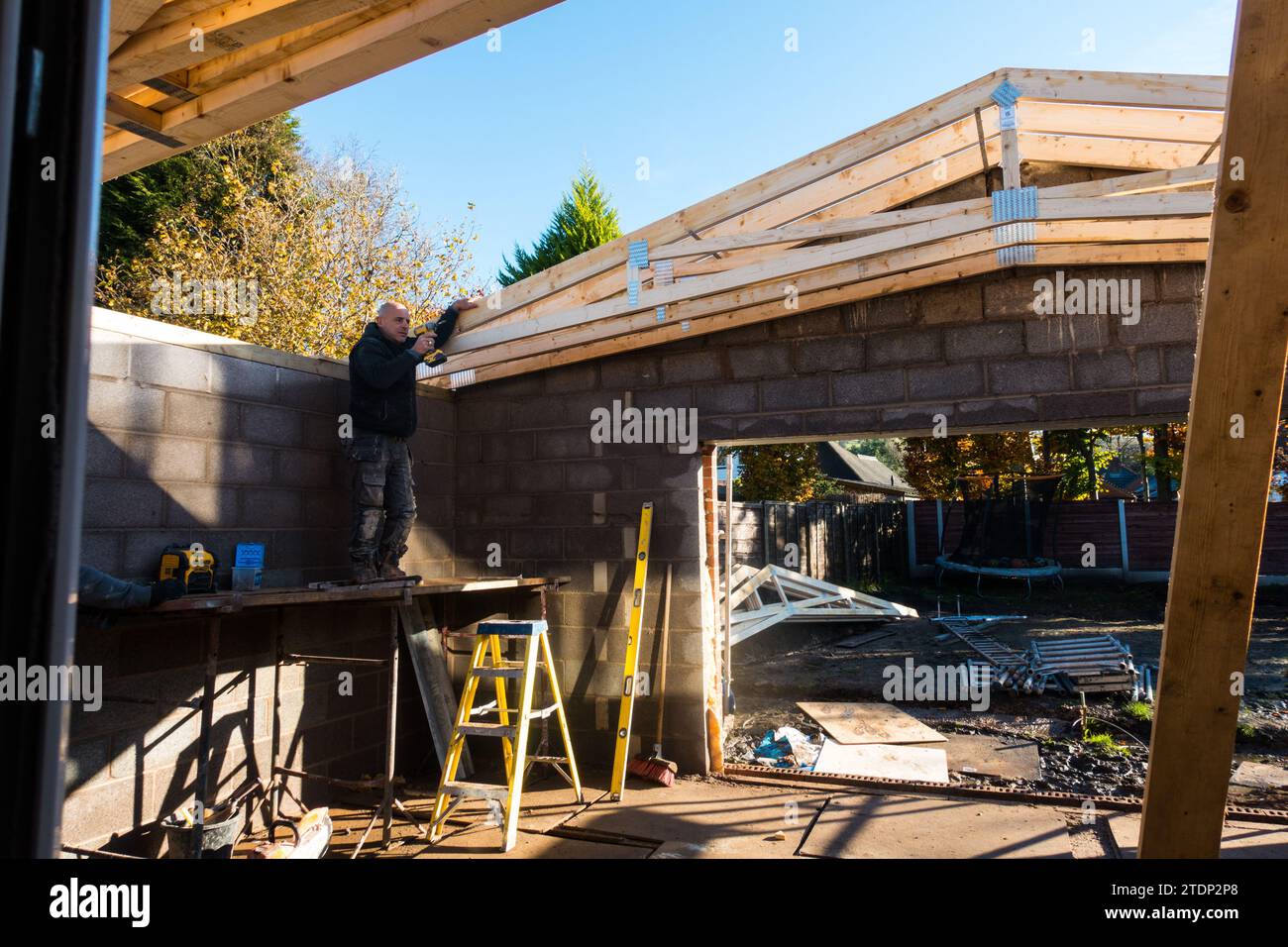 Roofing Rafters being put into a home extension. England UK Stock Photo ...