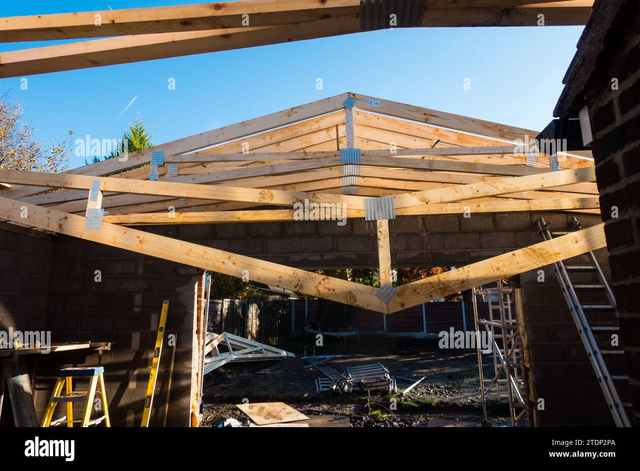 Roofing Rafters being put into a home extension. England UK Stock Photo ...