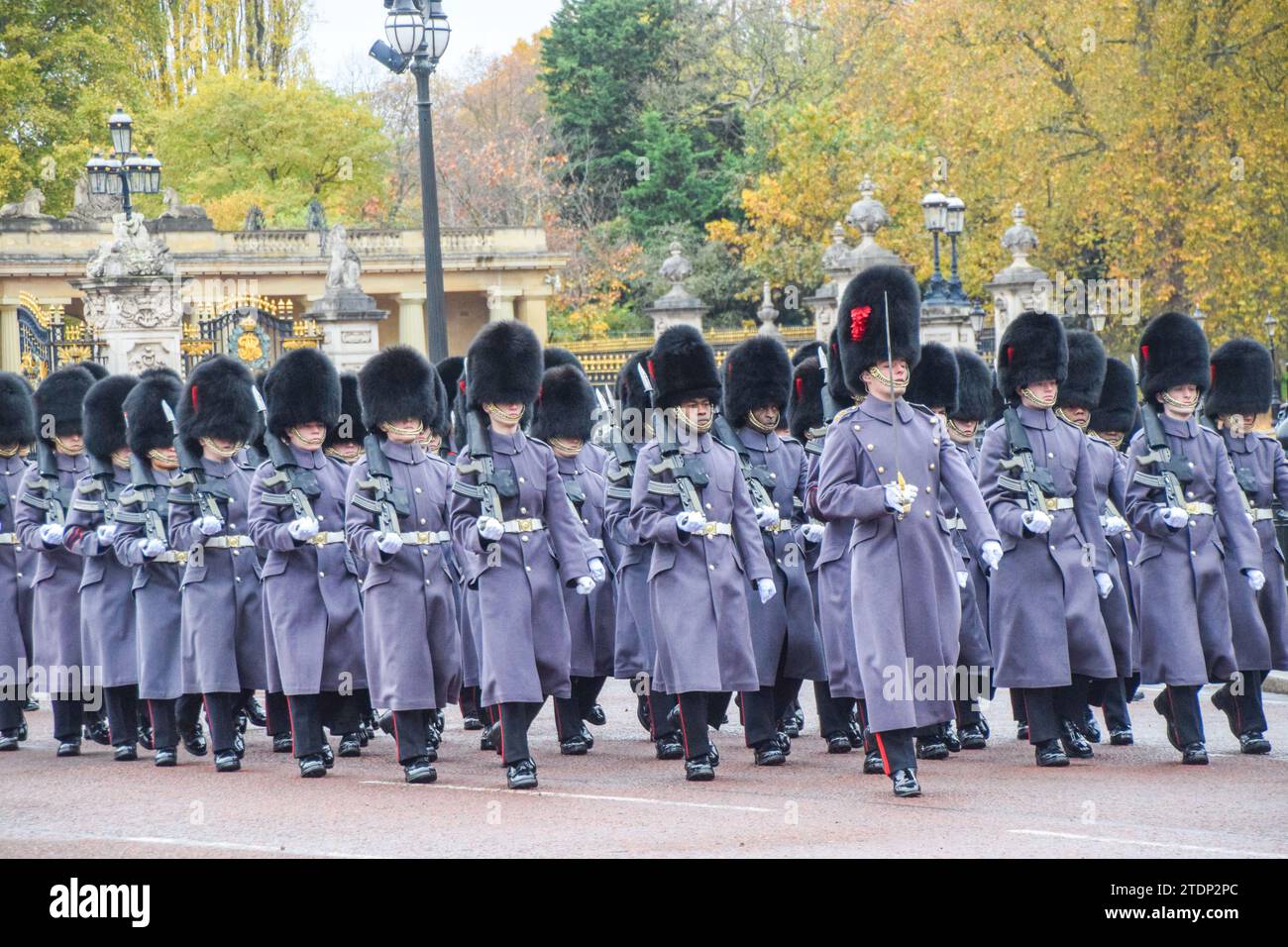 London, UK. 21st November 2023. King's Guards march outside Buckingham Palace during the State ...