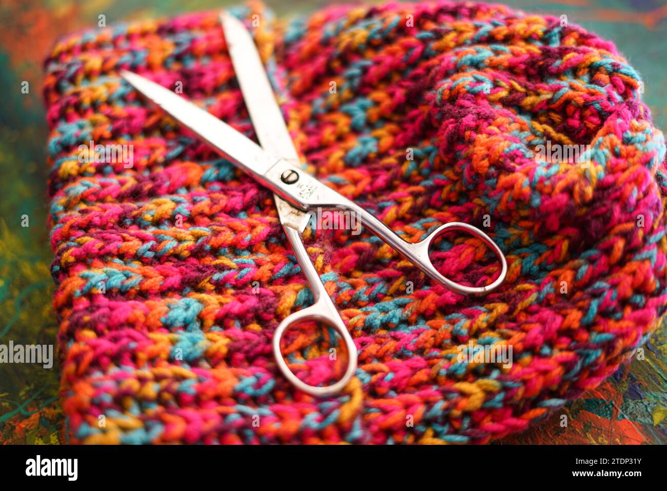 Knitting concept. Scissors, wool needles and colorful wool Stock Photo ...