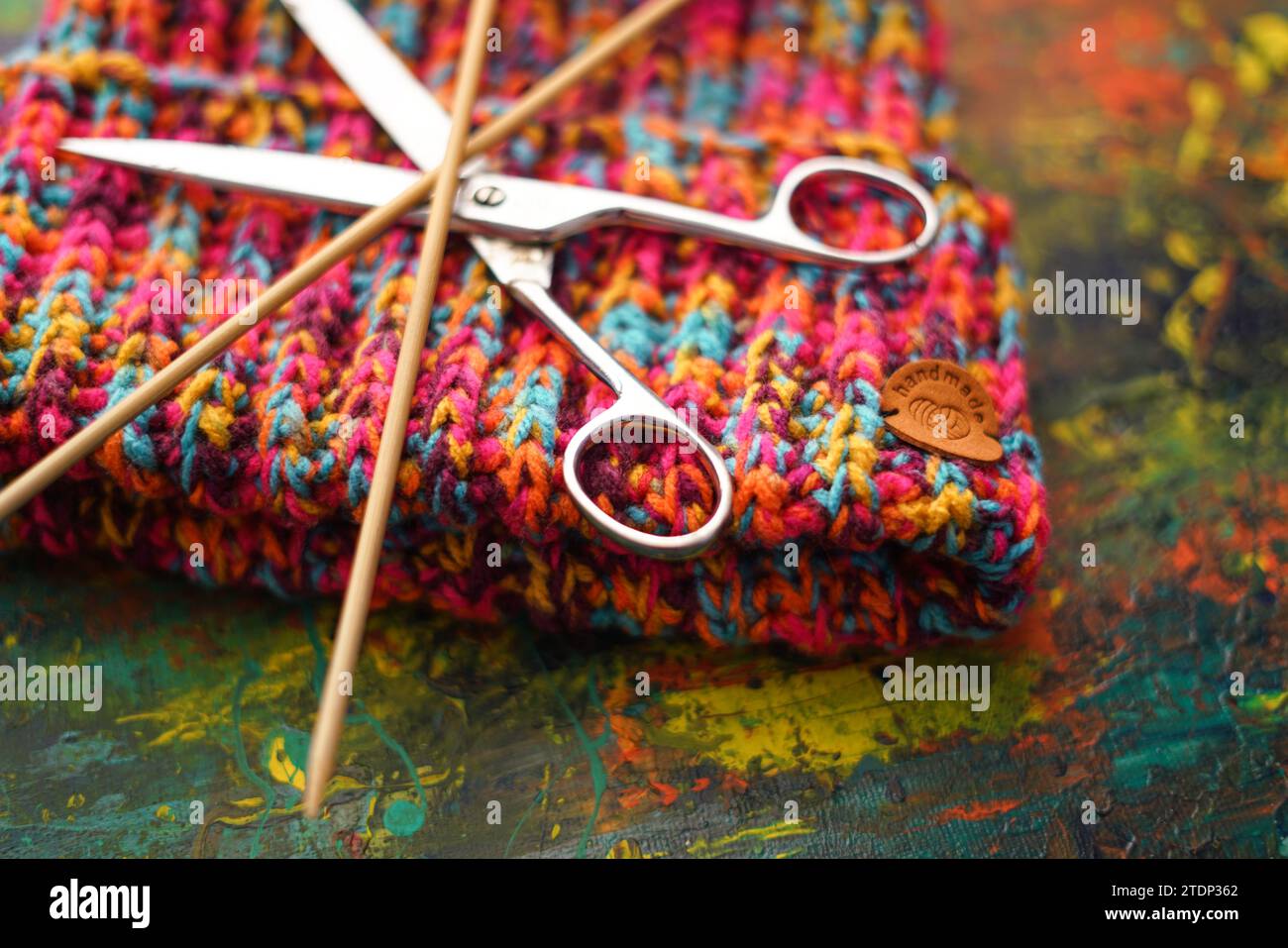 Knitting concept. Scissors, wool needles and colorful wool Stock Photo ...