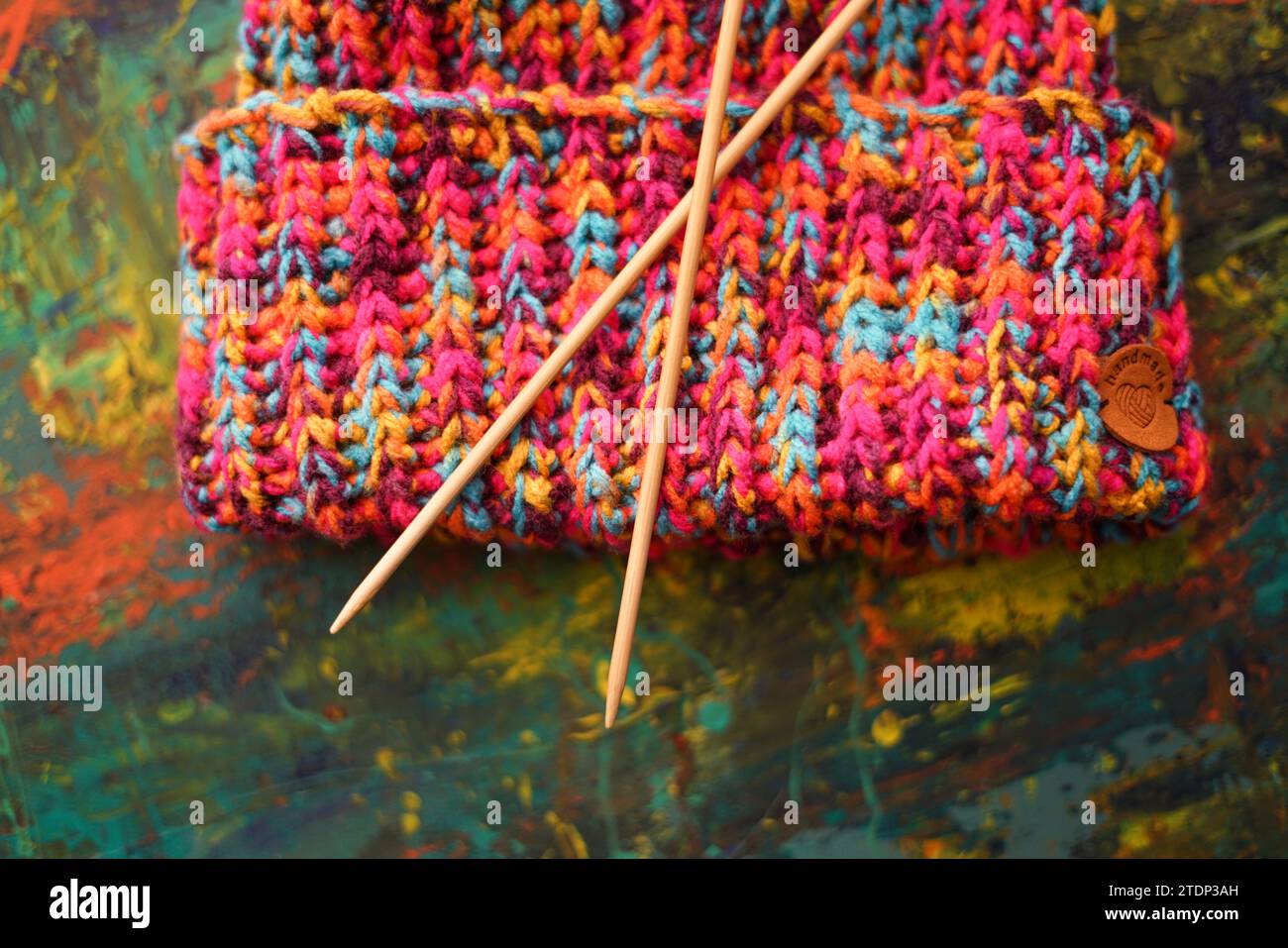 Knitting concept. Wool needles and colorful wool Stock Photo - Alamy