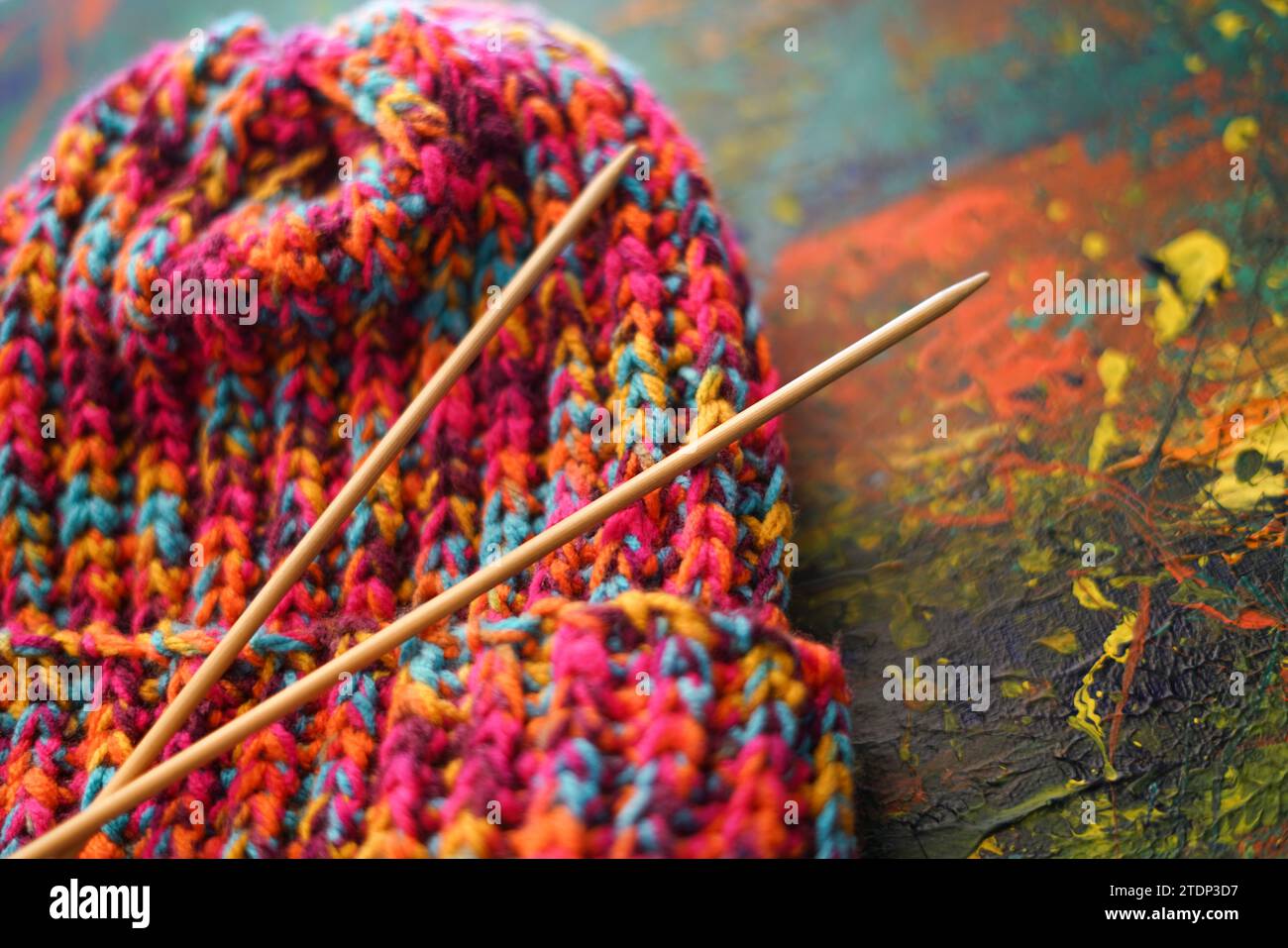 Knitting concept. Wool needles and colorful wool Stock Photo - Alamy