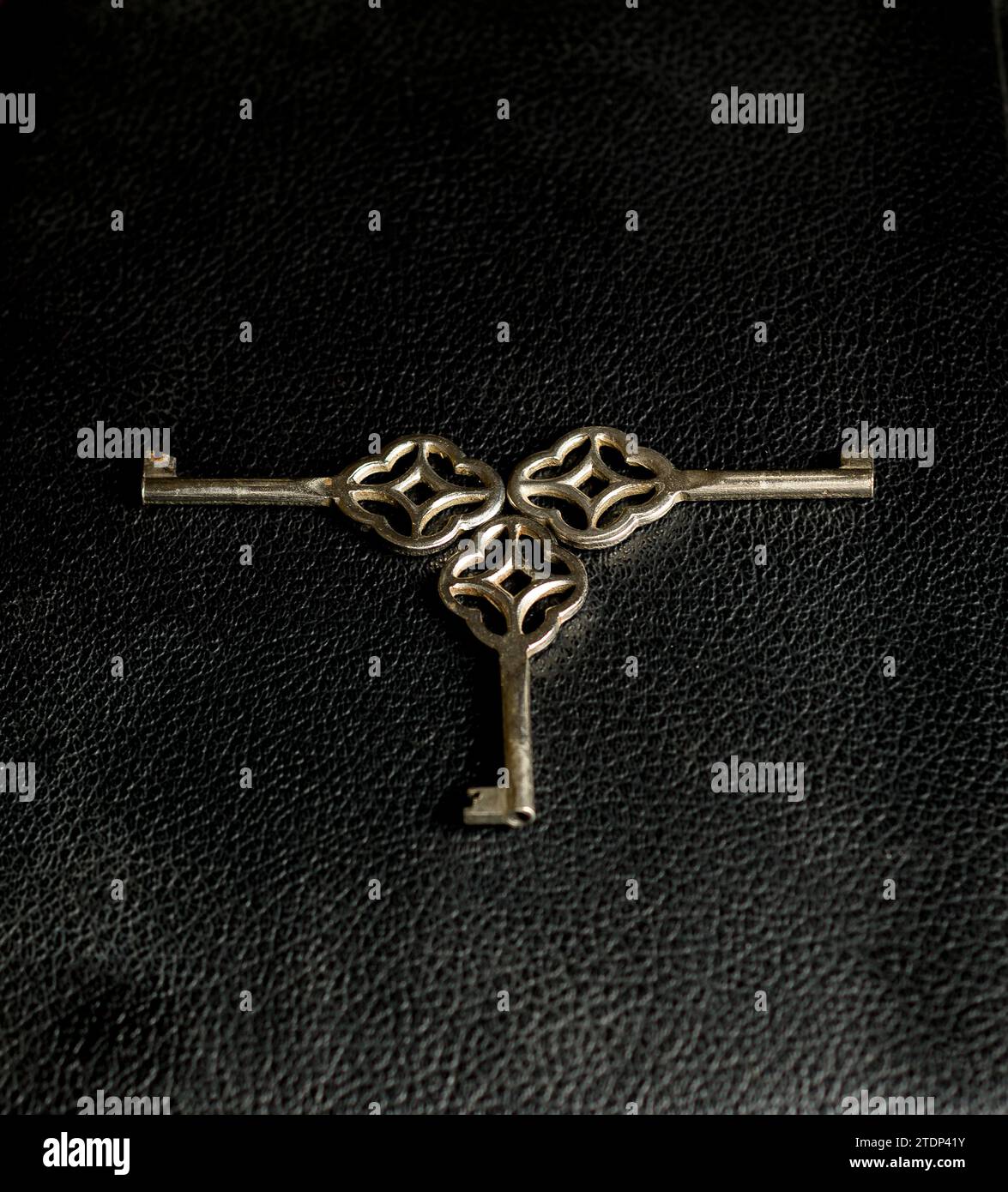 metal antique keys on square dark rough black background Stock Photo ...