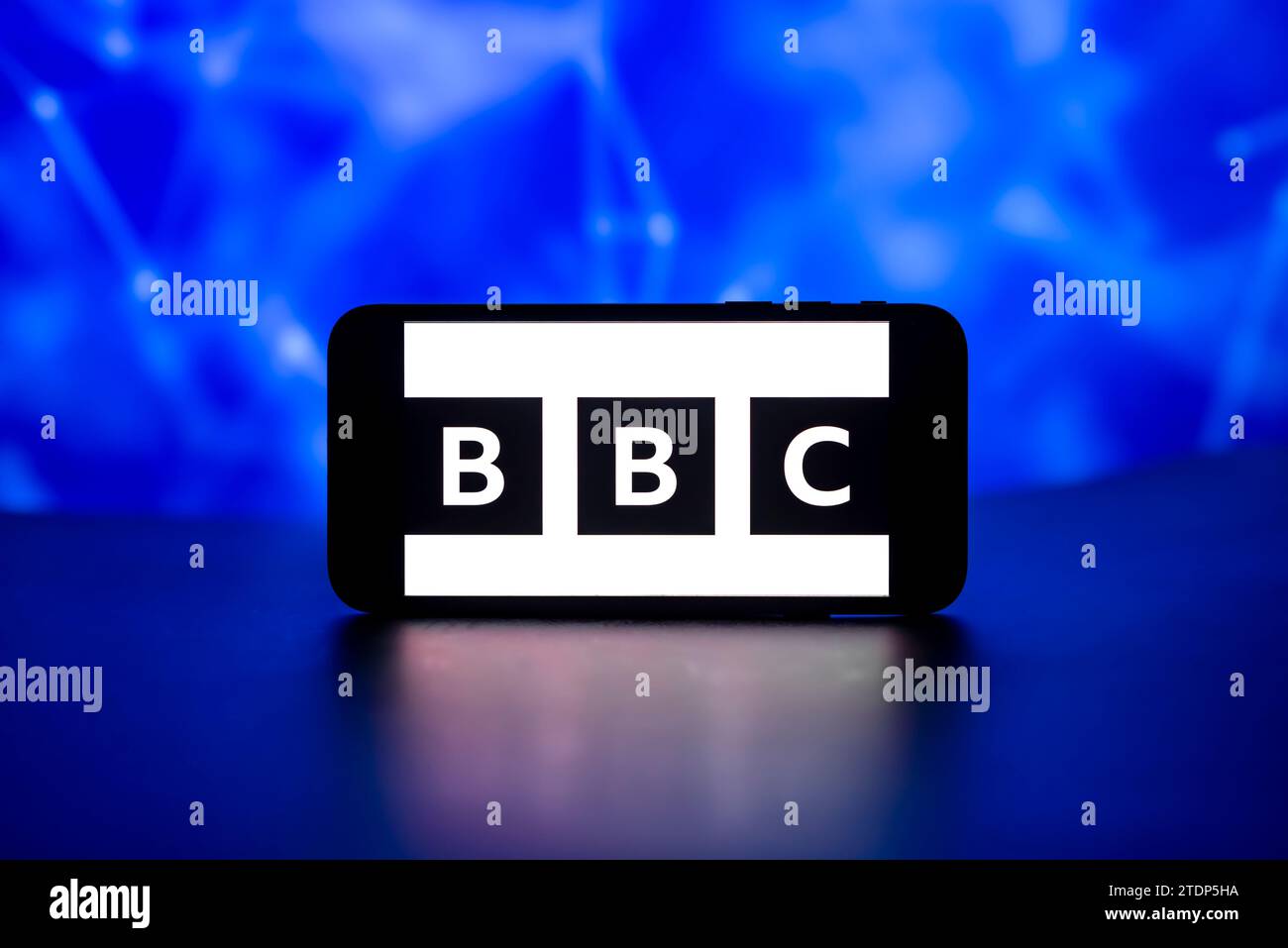 In this photo illustration, the BBC logo is seen displayed on a mobile ...