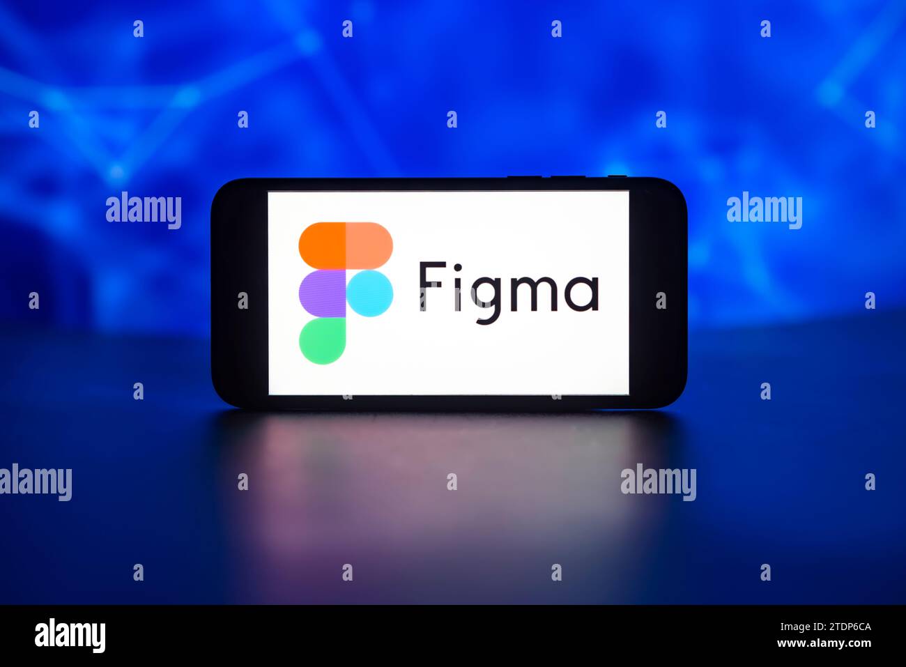 In this photo illustration, the Figma logo is seen displayed on a ...