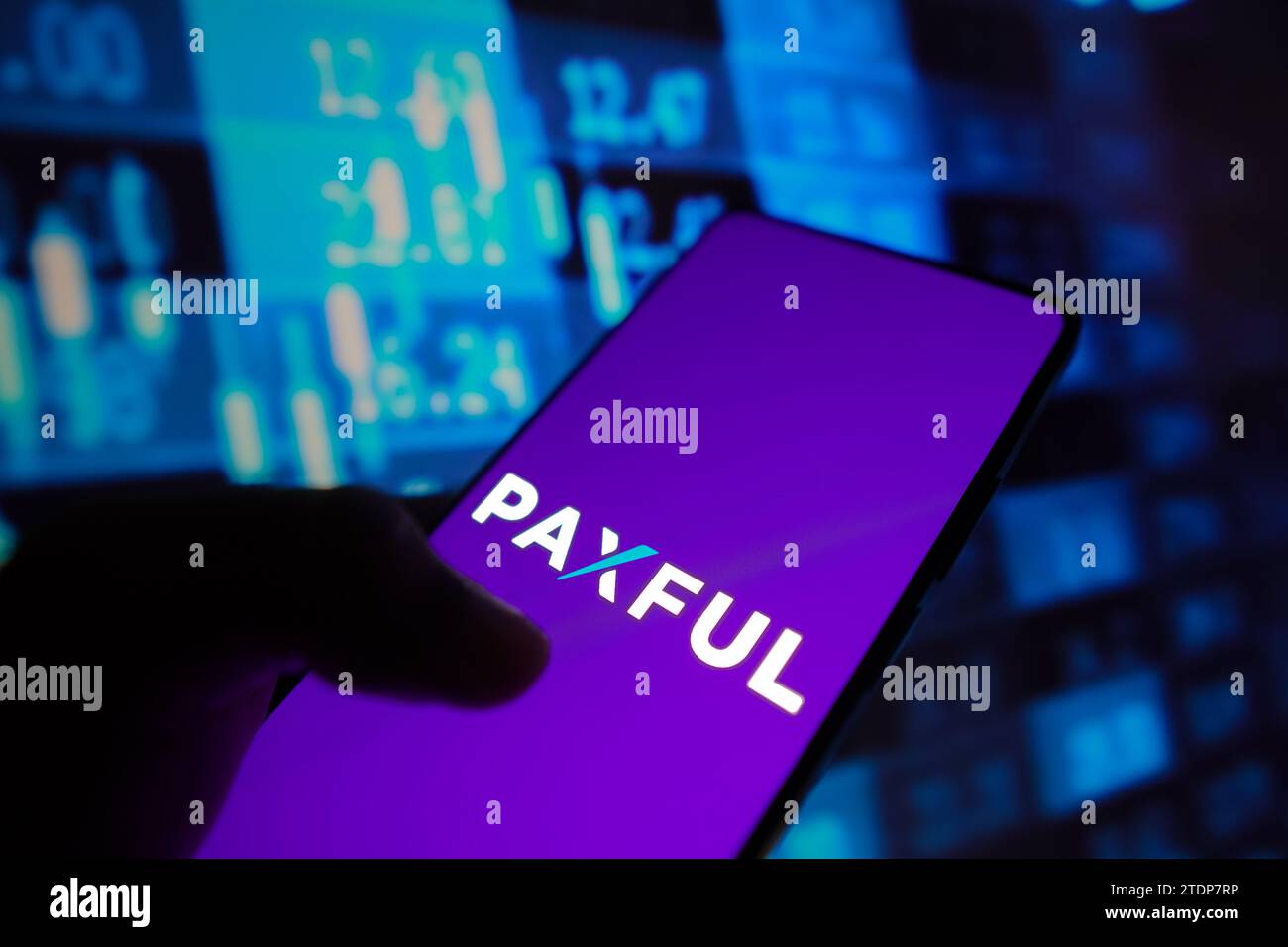 In this photo illustration, the Paxful logo is displayed on a ...