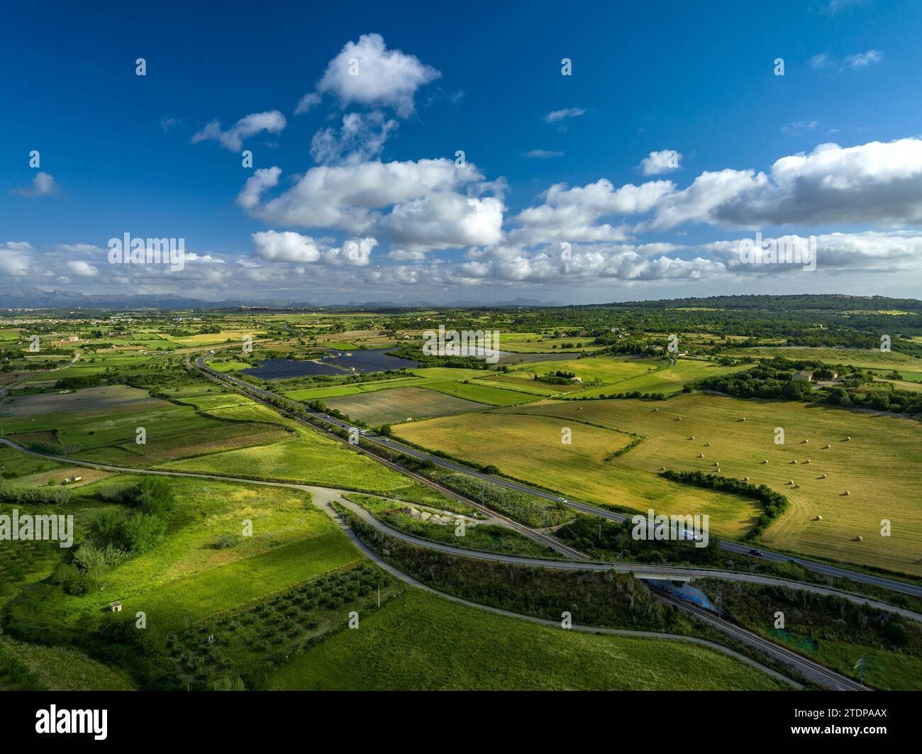 Aerial view of green fields and meadows on a spring morning in the Pla ...