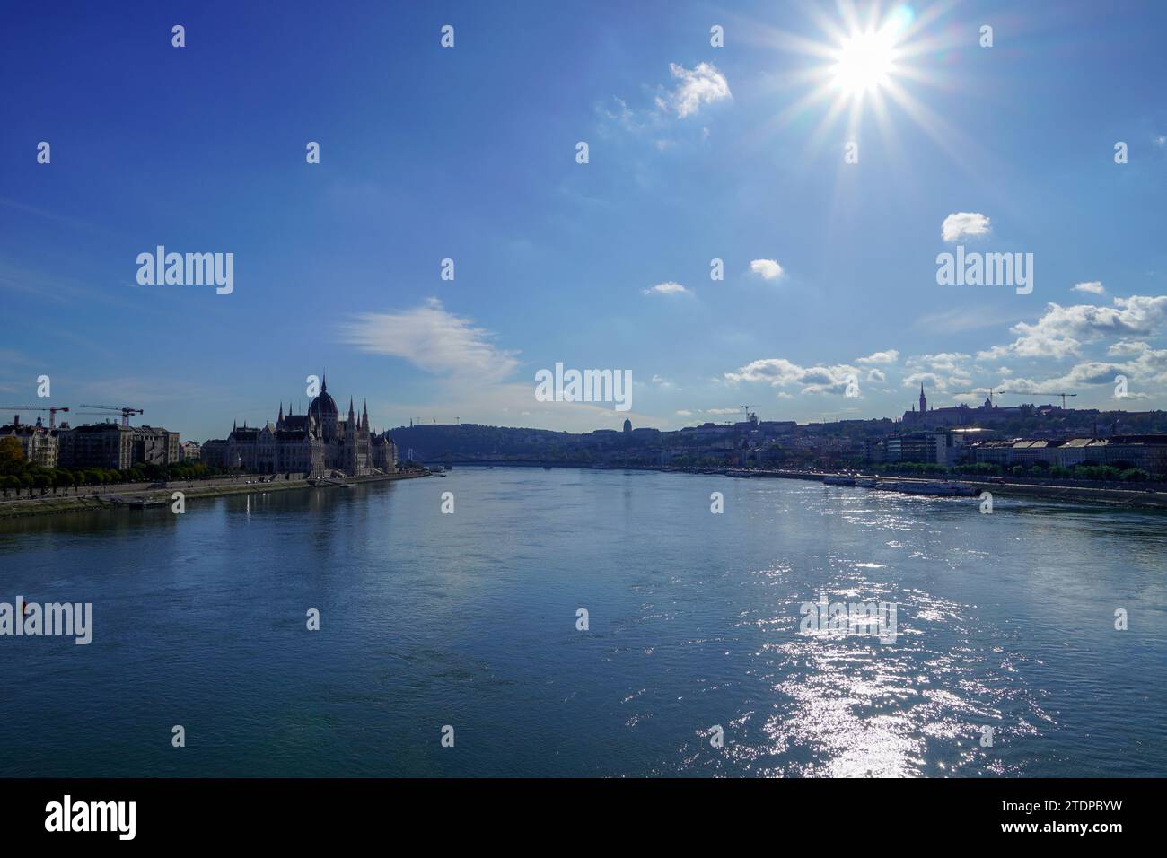 Danube river in Budapest, Hungary with floating sightseeing boat on the ...