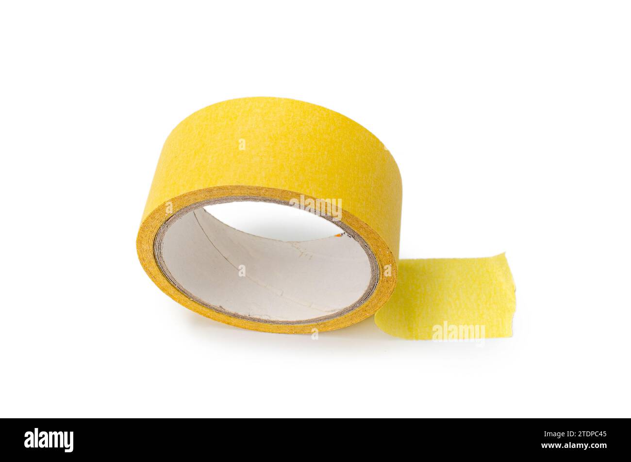 Roll of yellow masking tape on white background Stock Photo - Alamy