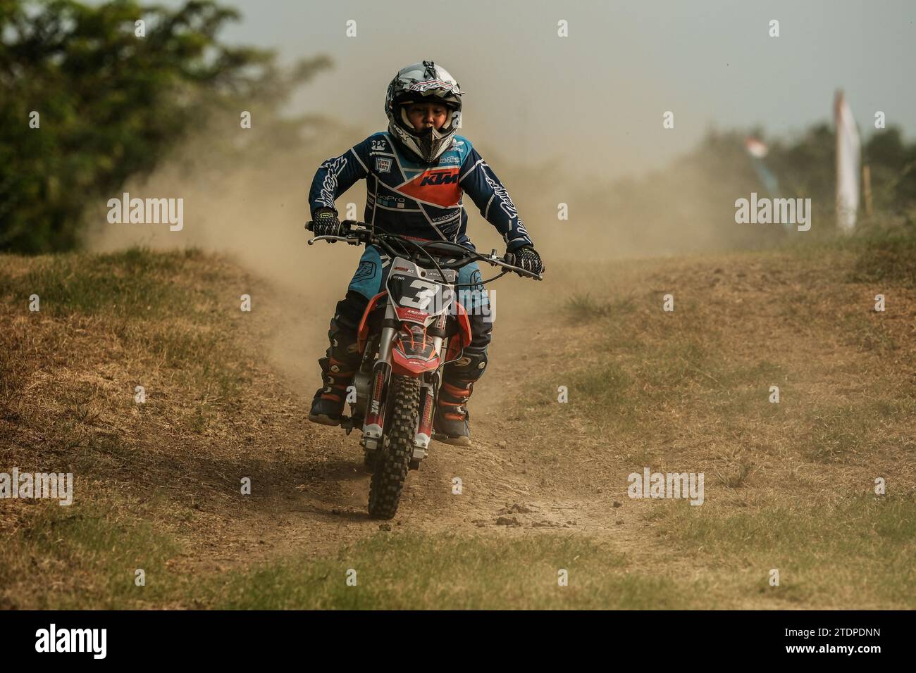 A motocross racer in action. Regular race training sessions before the ...