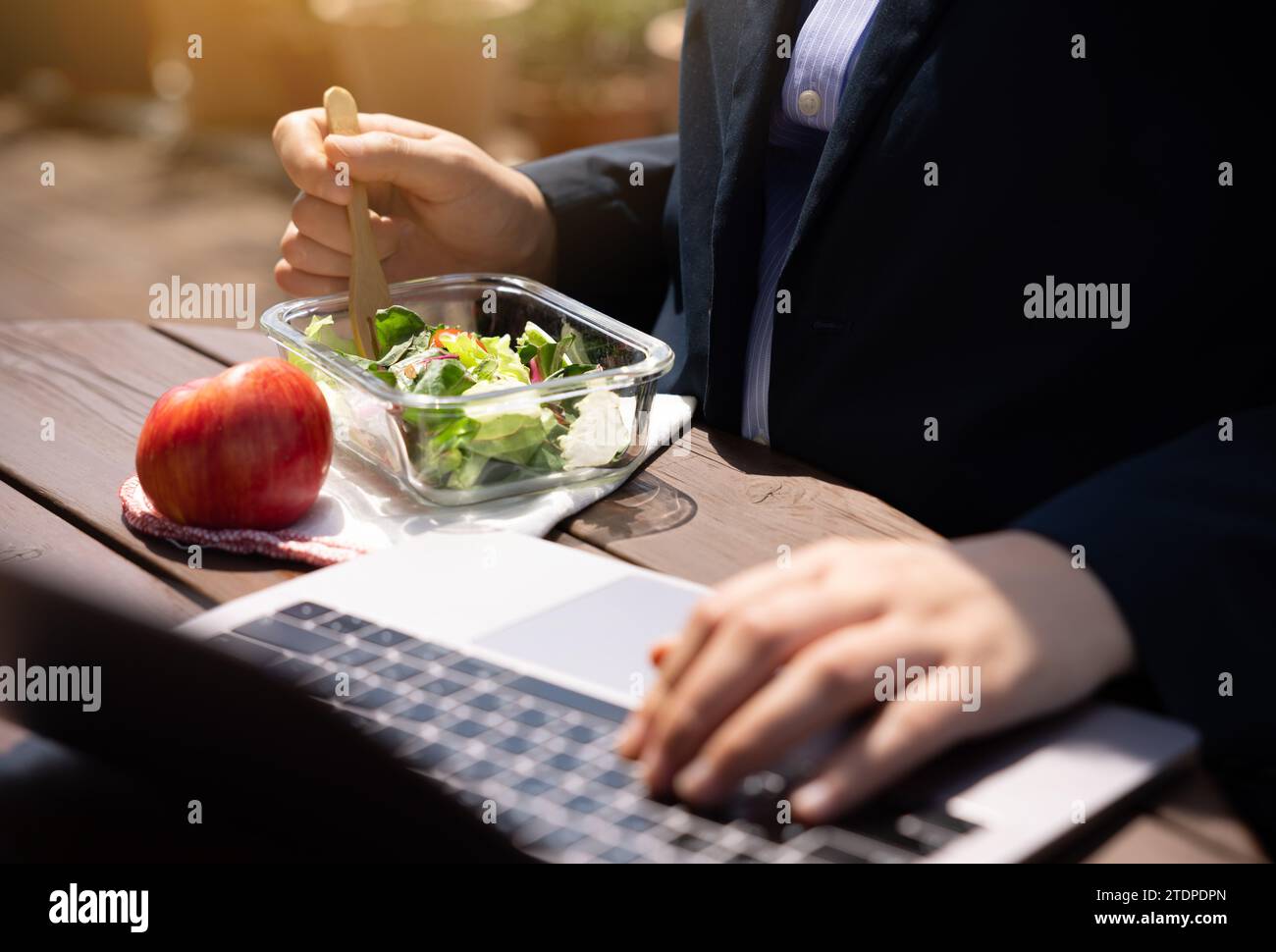 A female office worker is having a lunch break alone at work Stock ...