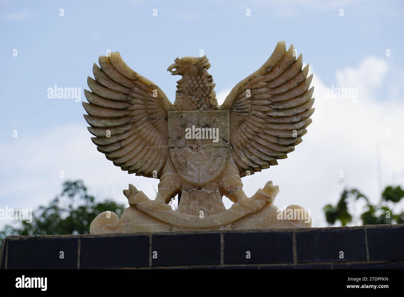 Garuda Pancasila (Indonesian five principles) with a natural background ...