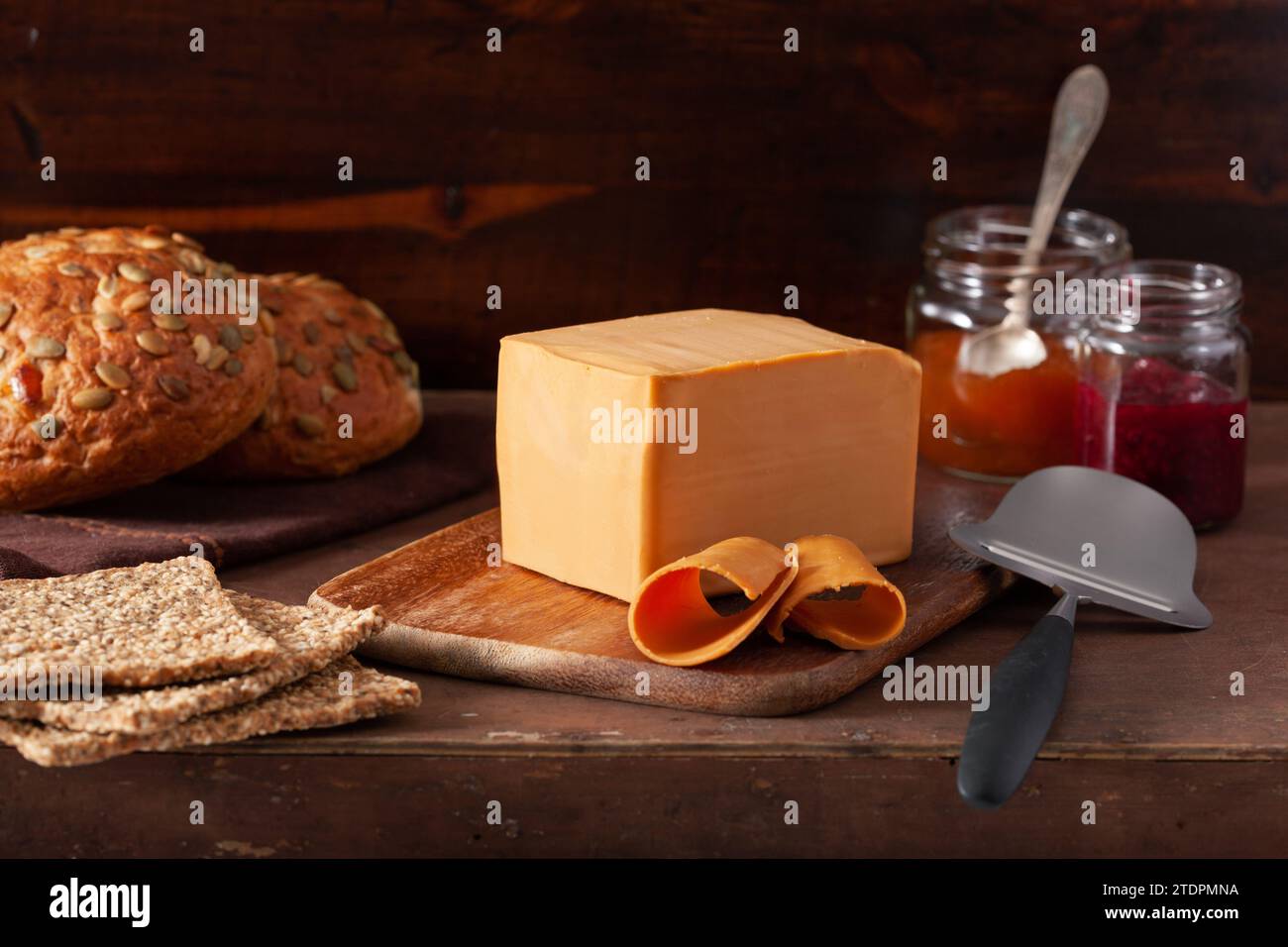 Norwegian brunost traditional brown cheese Stock Photo - Alamy