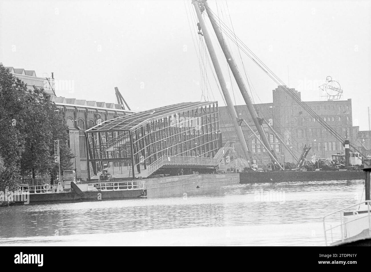 Bridges, bridge building. floating trestle lifts a bridge section from ...