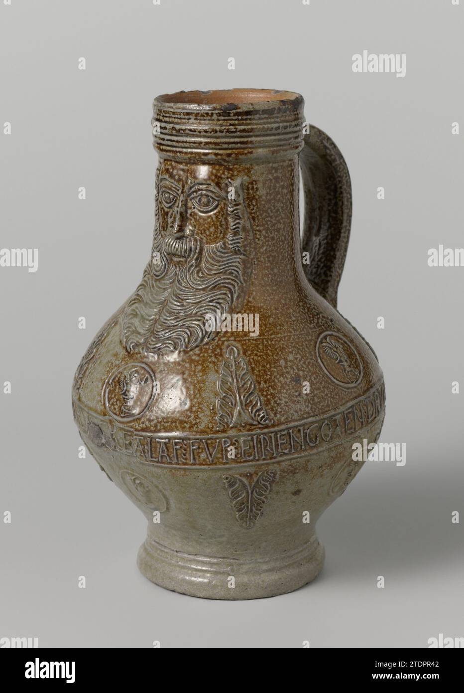 Jug (Bartmann jug) with portraits, leaves and an inscription, anonymous ...