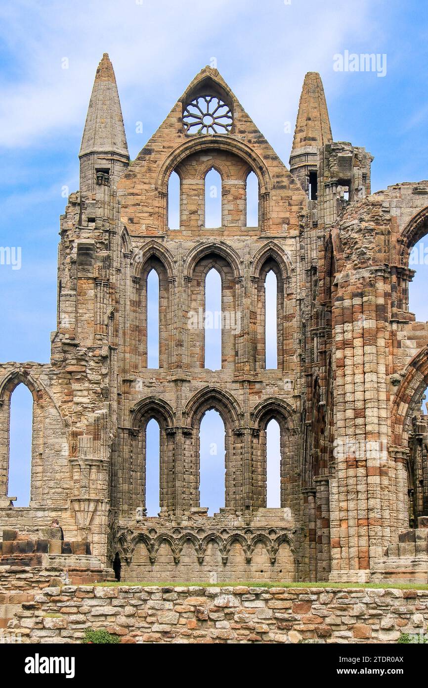 A view of Whitby Abbey in Yorkshire with its ruined windows, columns ...