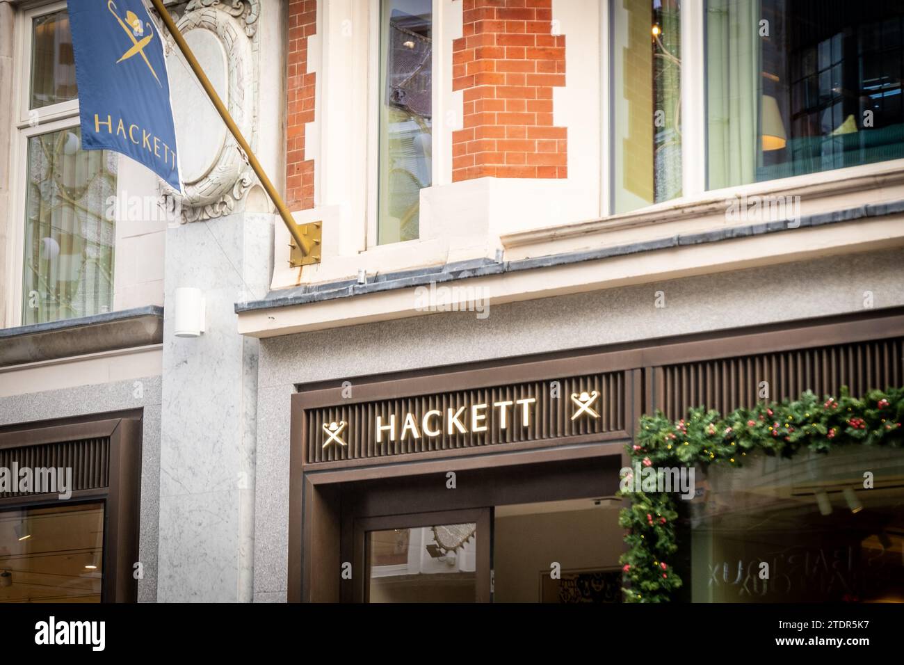 LONDON- DECEMBER 14, 2023: Hackett store on Bond Street. Luxury heritage British fashion brand ...