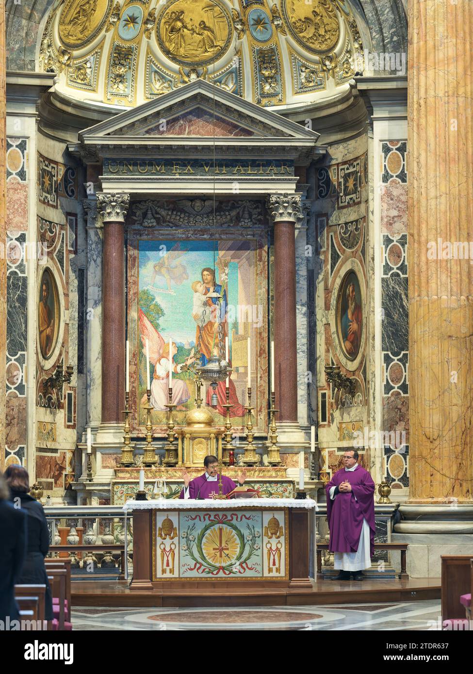 Priests celebrate mass in St Anthony's chapel at St Peter's basilica ...