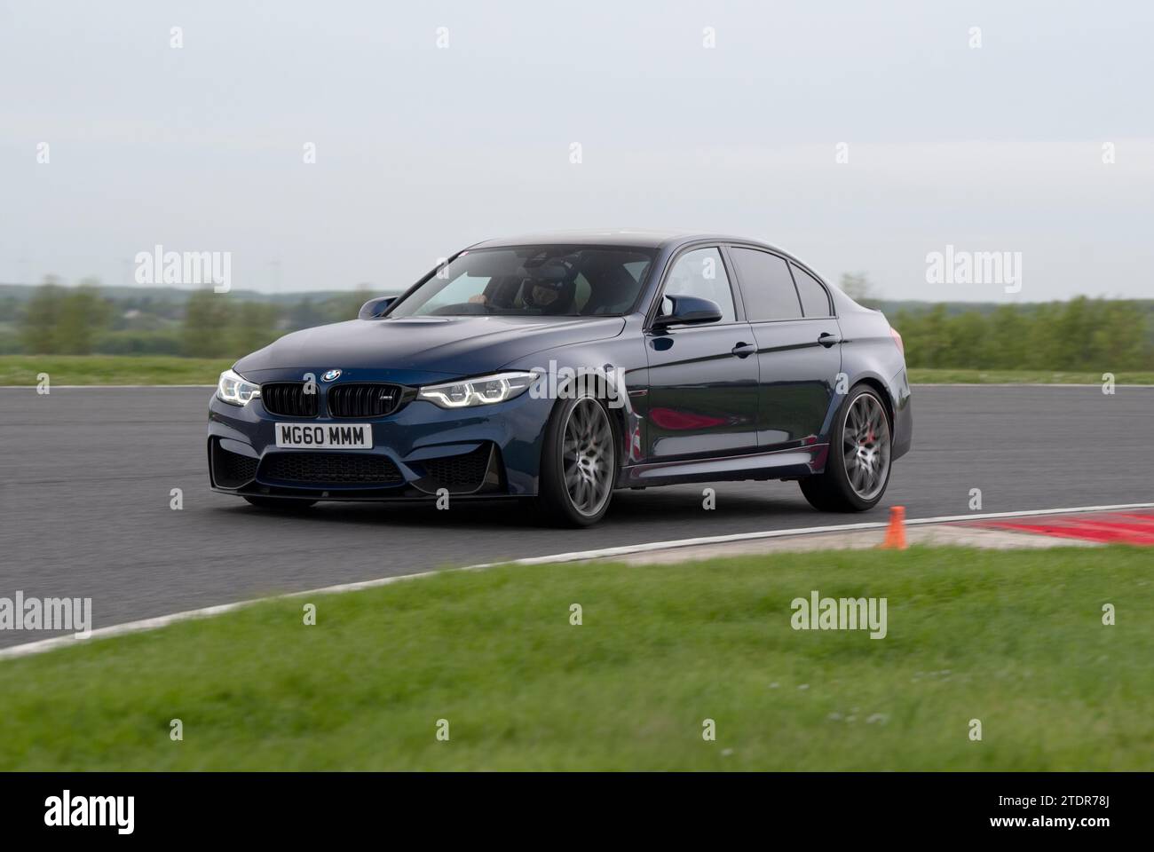 BMW M3 driving fast on track during a race track day event Stock Photo ...