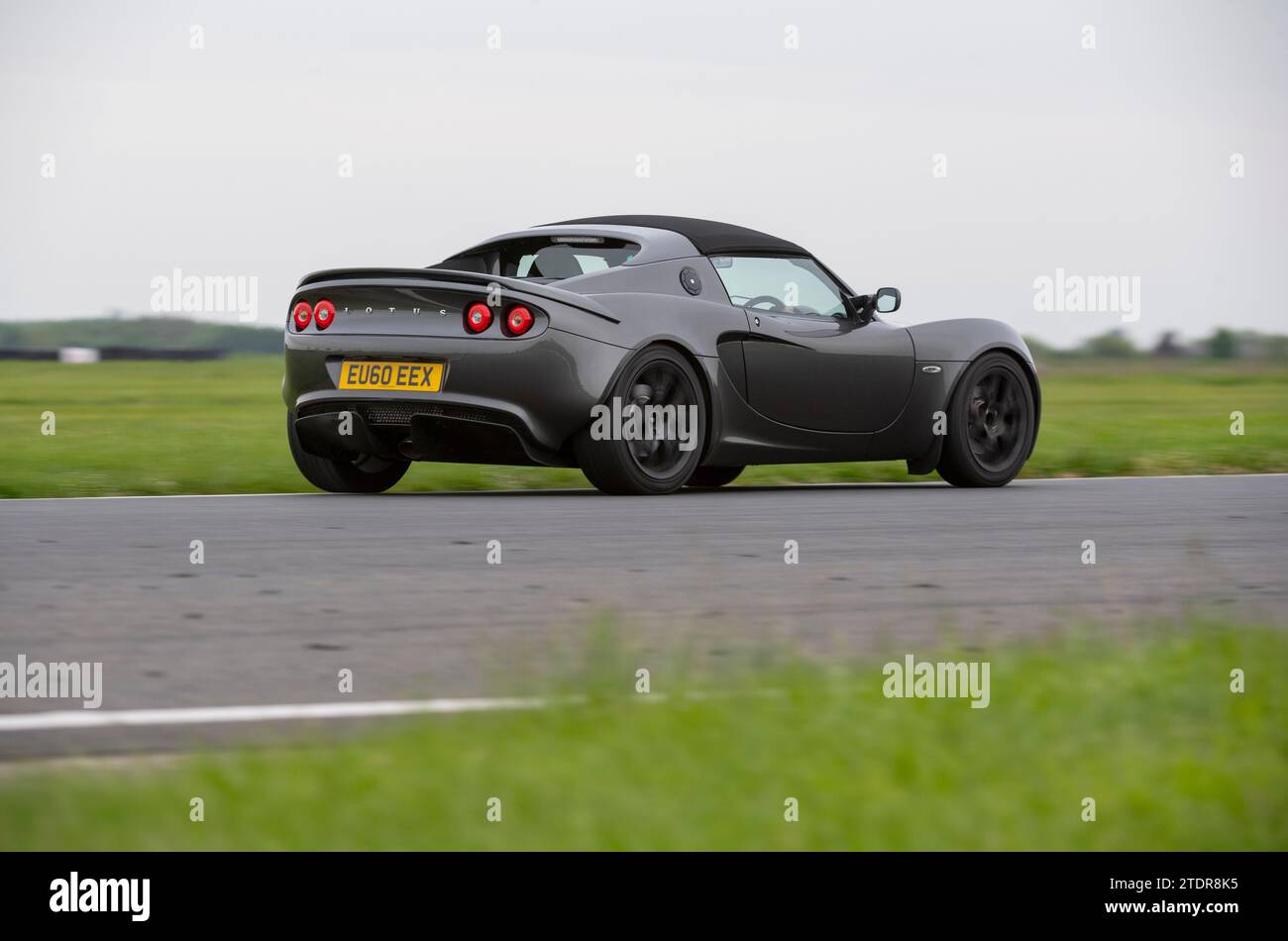 Lotus Elise driving fast on track during a race track day event Stock ...