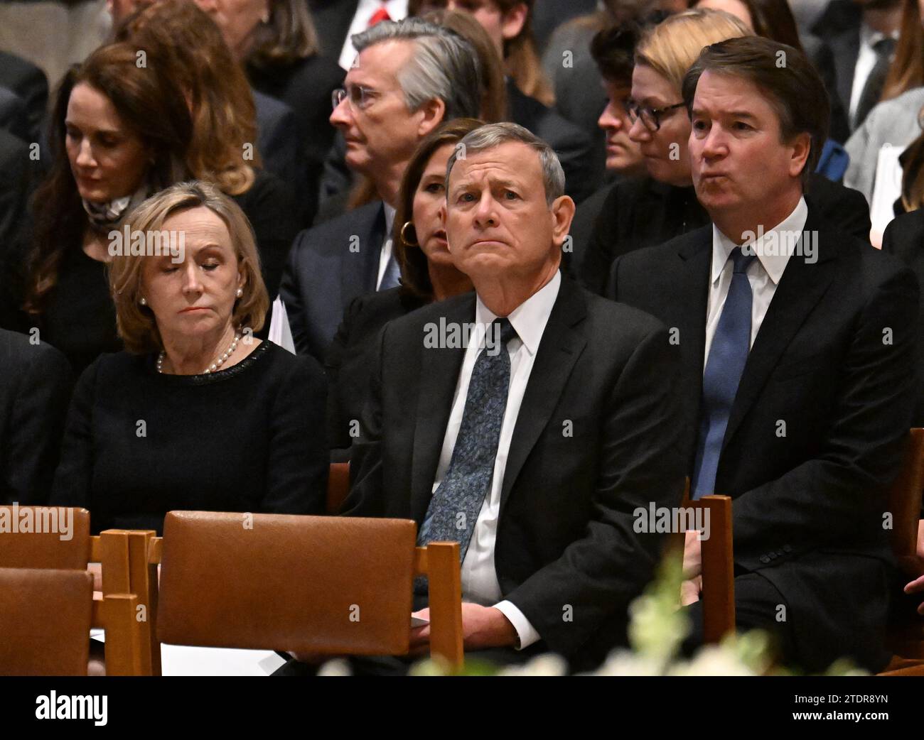 US Supreme Court Chief Justice John Roberts (C), his wife Jane Sullivan ...