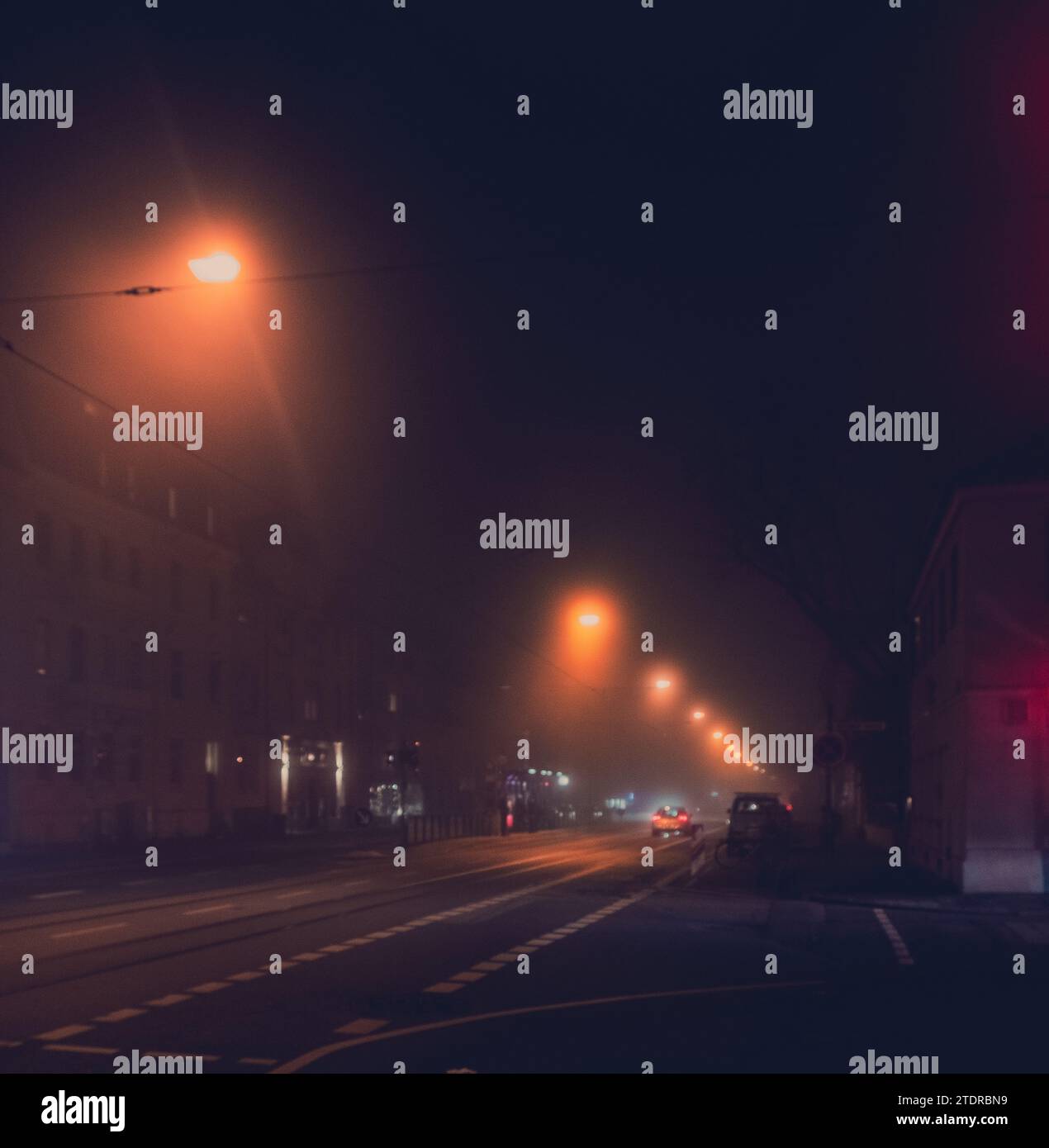 street light color during a foggy night in Germany Stock Photo - Alamy