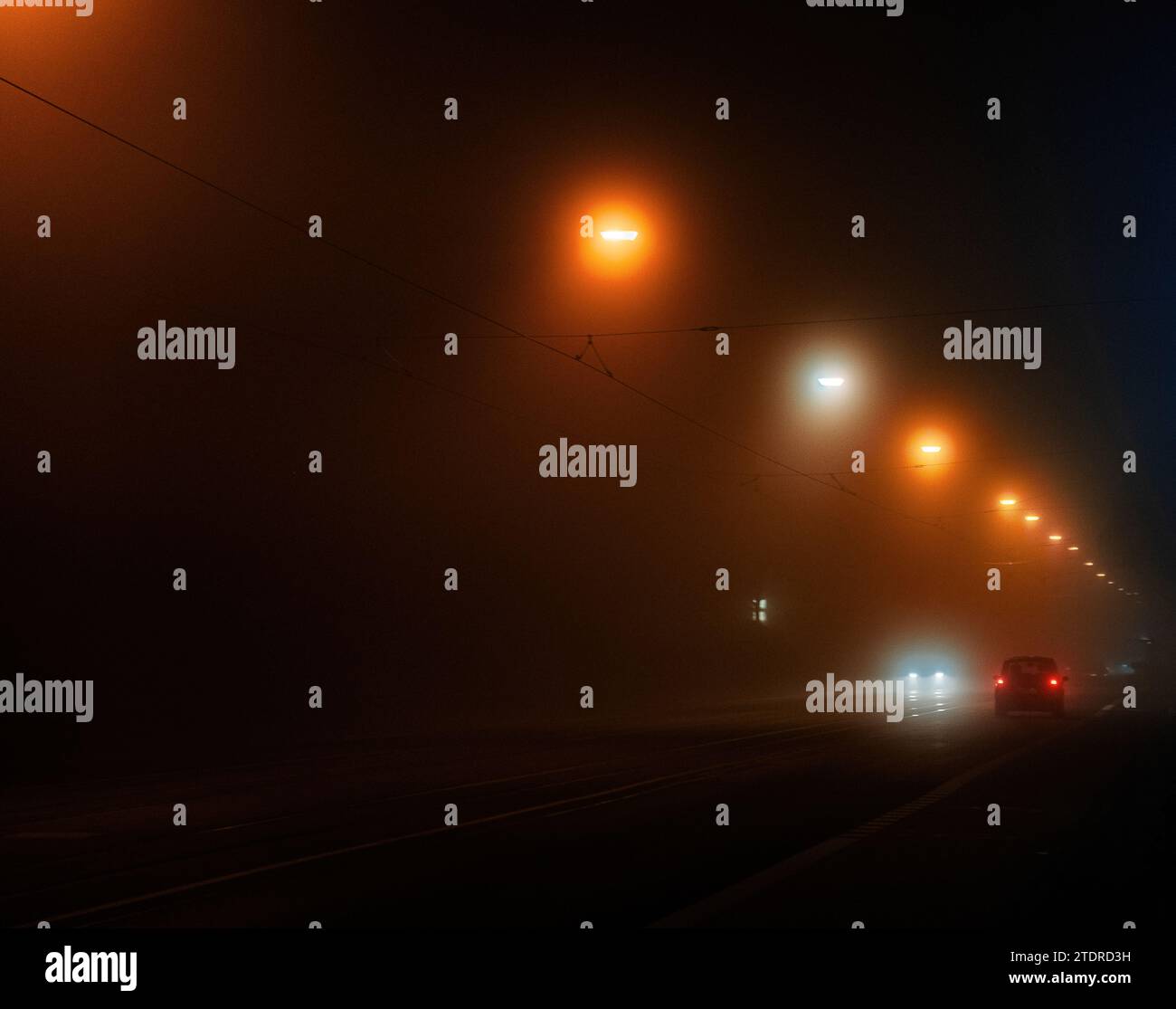 street light color during a foggy night in Germany Stock Photo - Alamy