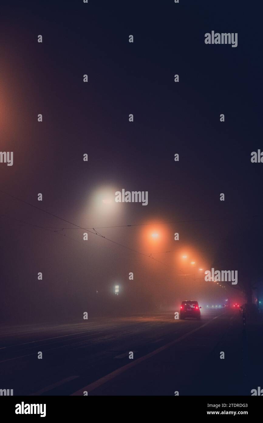 street light color during a foggy night in Germany Stock Photo - Alamy