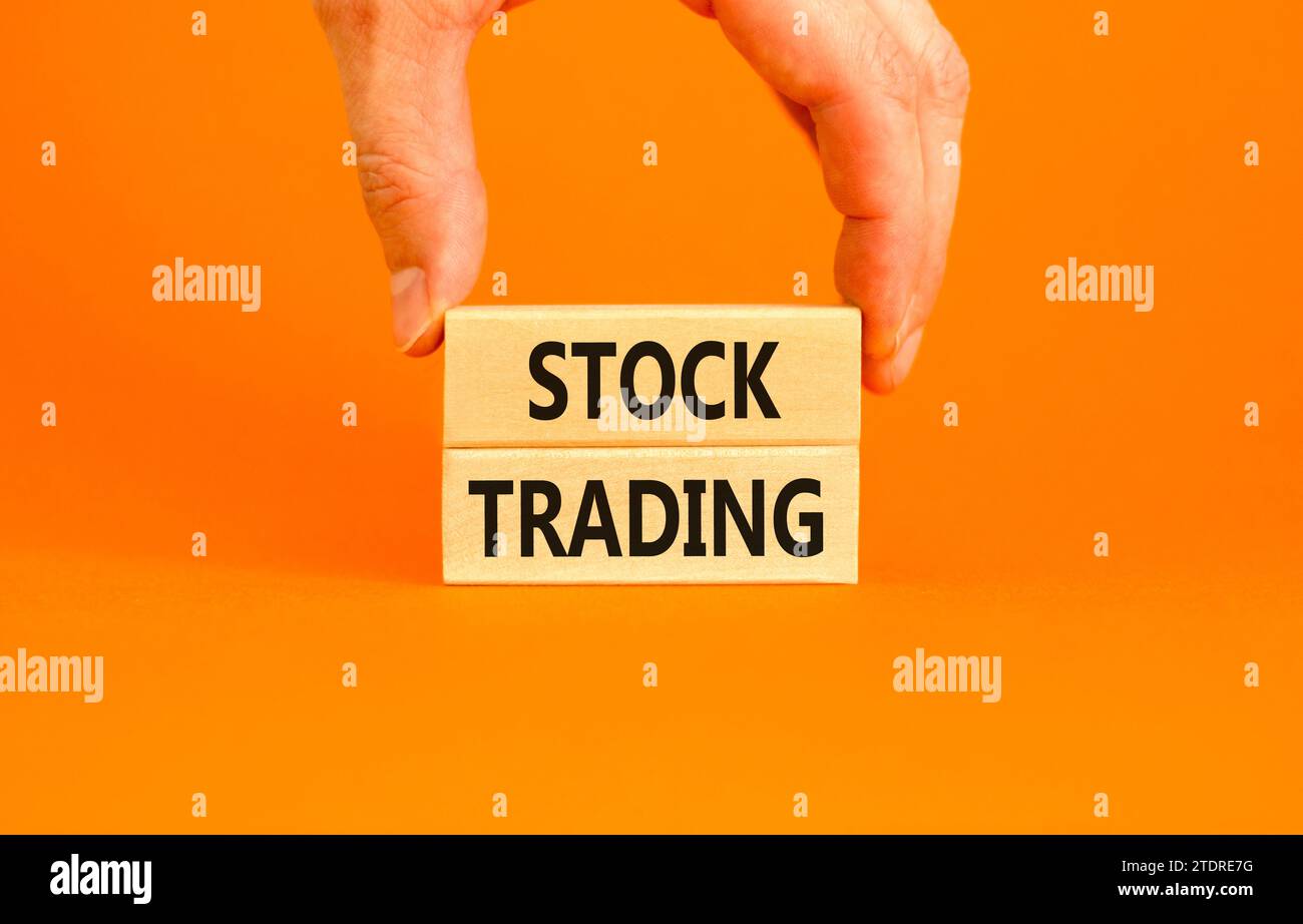 Stock trading symbol. Concept words Stock trading on beautiful wooden ...