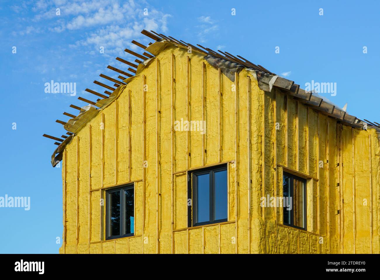 The facade of the residential house sprayed with a layer of ...